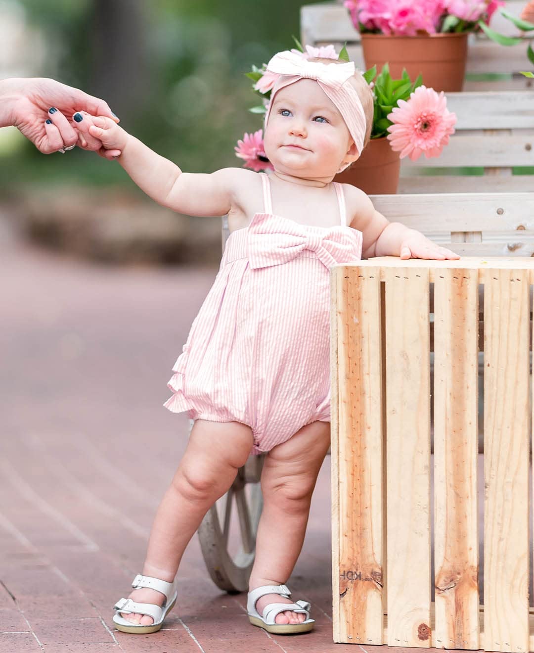RuffleButts® Baby/Toddler Girls Pink Striped Seersucker Bubble Romper w/Bow - 3-6m