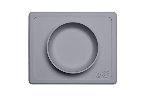 ezpz Mini Bowl - 100% Silicone Suction Bowl with Built-in Placemat for Infants + Toddlers - Comes with a Reusable Travel Bag (Gray)