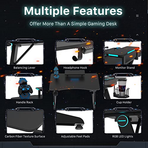 JOY worker RGB Gaming Desk 47 Inch with Led Lights, Music Sync Computer Gamer Desk, Carbon Fiber Surface PC Gaming Desk with Monitor Stand, Ergonomic Z Shaped Gaming Table with Plug Board Holder,Black