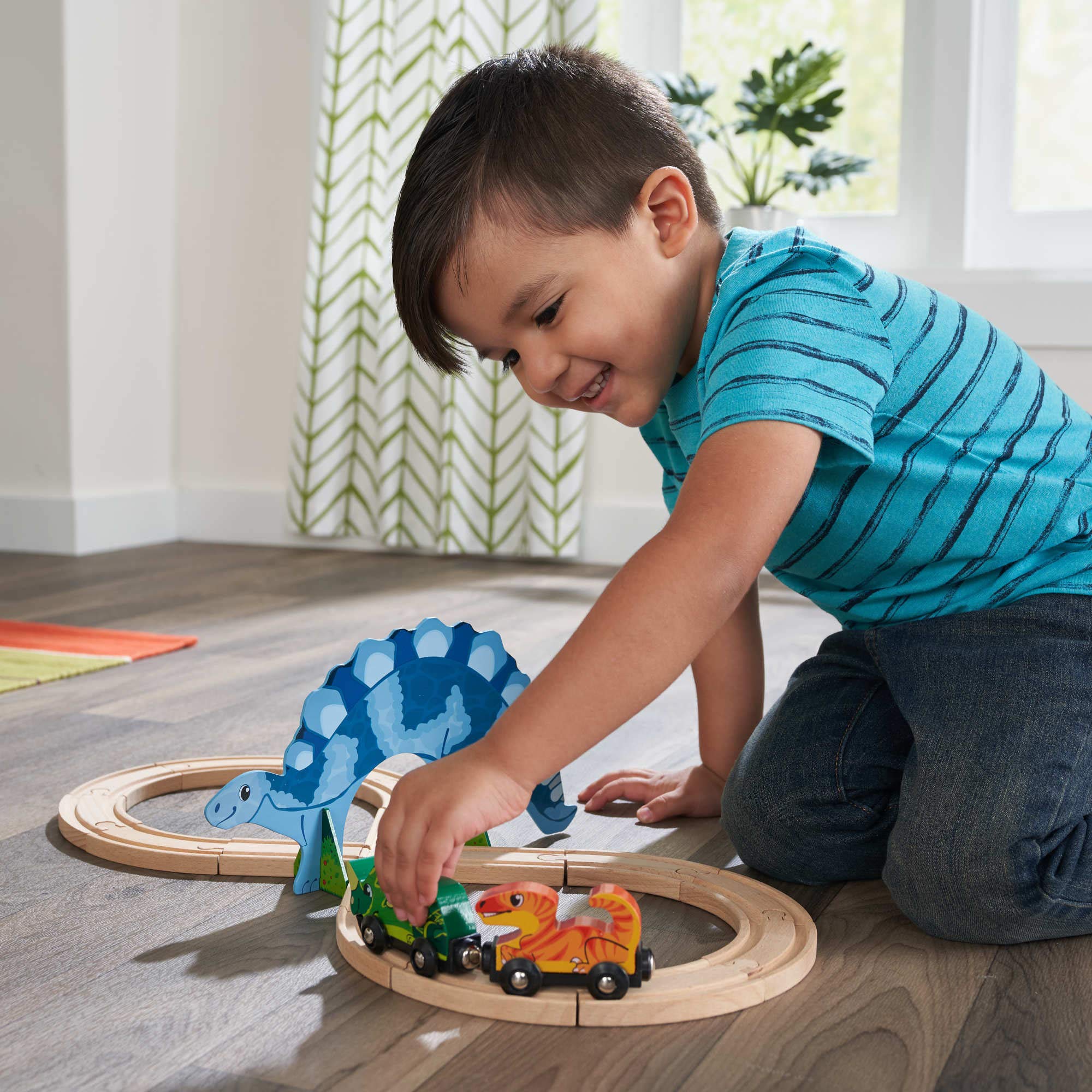 KidKraft Adventure Tracks™: Dino World T-Rex Tremor Cave 15-pc. Wooden Train Track and Vehicle Play Set, Gift for Ages 3+