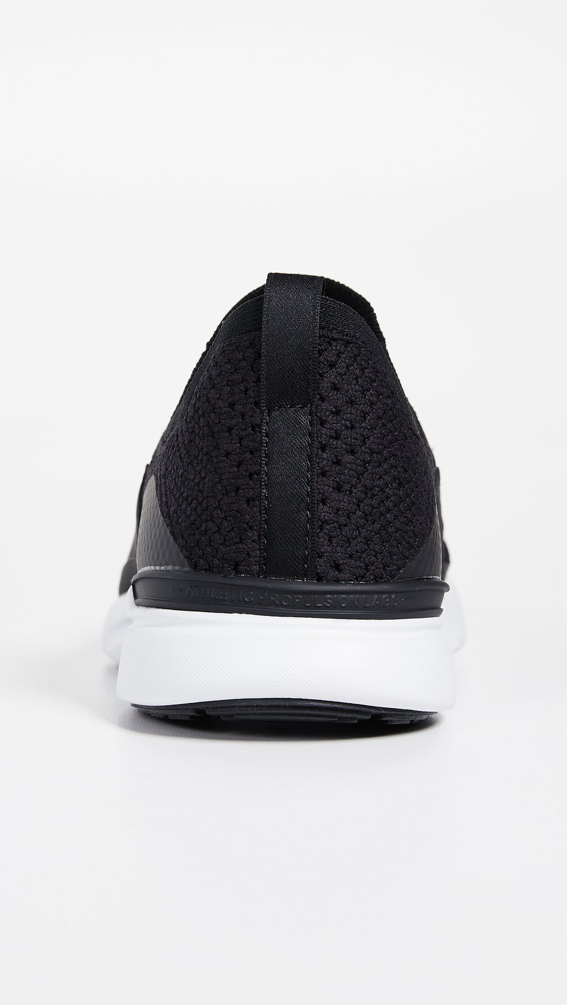 APL: Athletic Propulsion Labs Women's TechLoom Bliss Sneakers, Black/Black/White, 7 Medium US