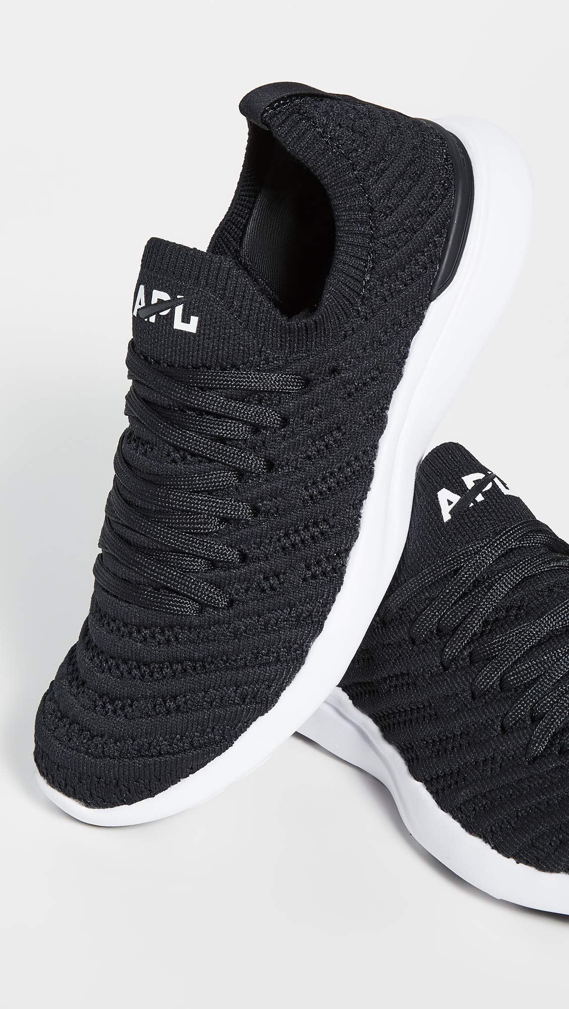 APL: Athletic Propulsion Labs Women's Techloom Wave Sneakers, Black/White, 10 Medium US
