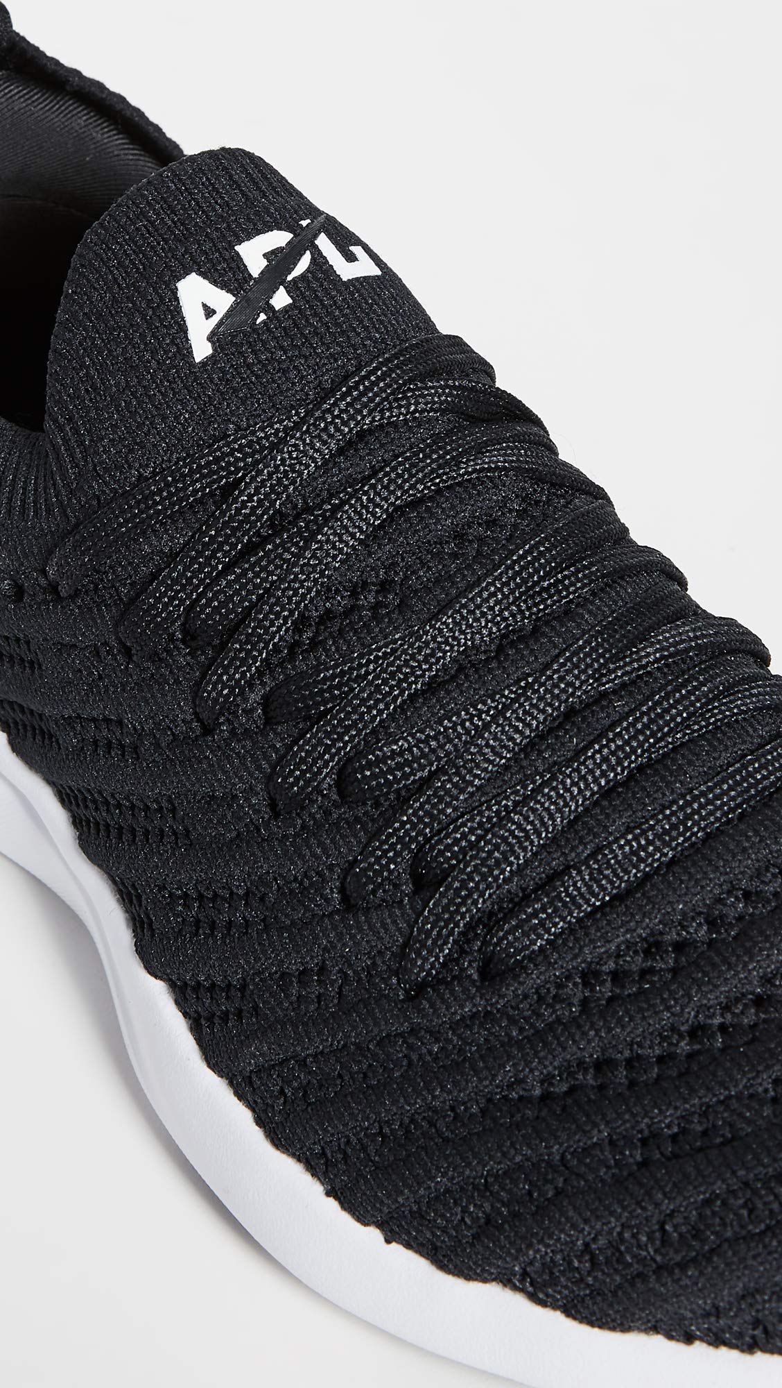 APL: Athletic Propulsion Labs Women's Techloom Wave Sneakers, Black/White, 10 Medium US