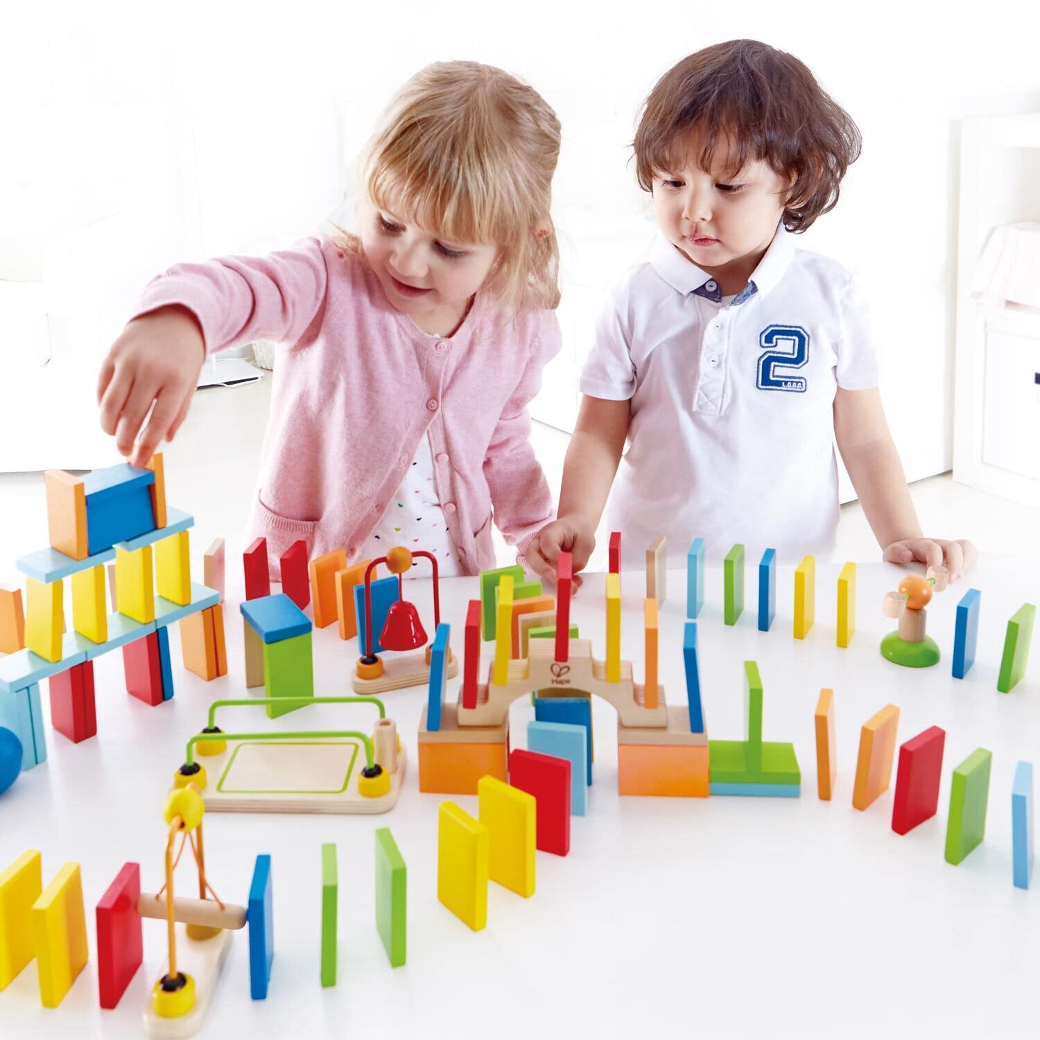 Hape Dynamo Wooden Domino Set Award Winning Domino Racing Building Block Set for Kids, 107 Solid Pieces of Fun Filled Racing, Building and Stacking