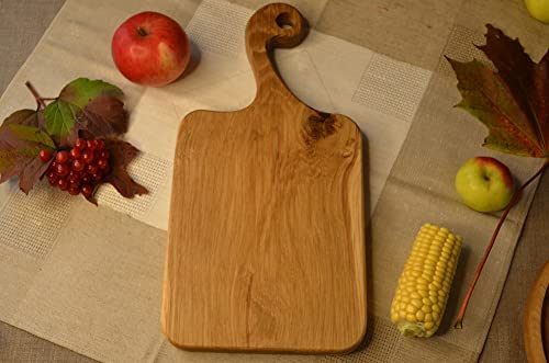 Rectangular wooden cutting board made of solid wood. Size: total length - 13.38 inches, width - 6.29 inches, thickness - 0.78 inches. The handle length is 4.72 inches.