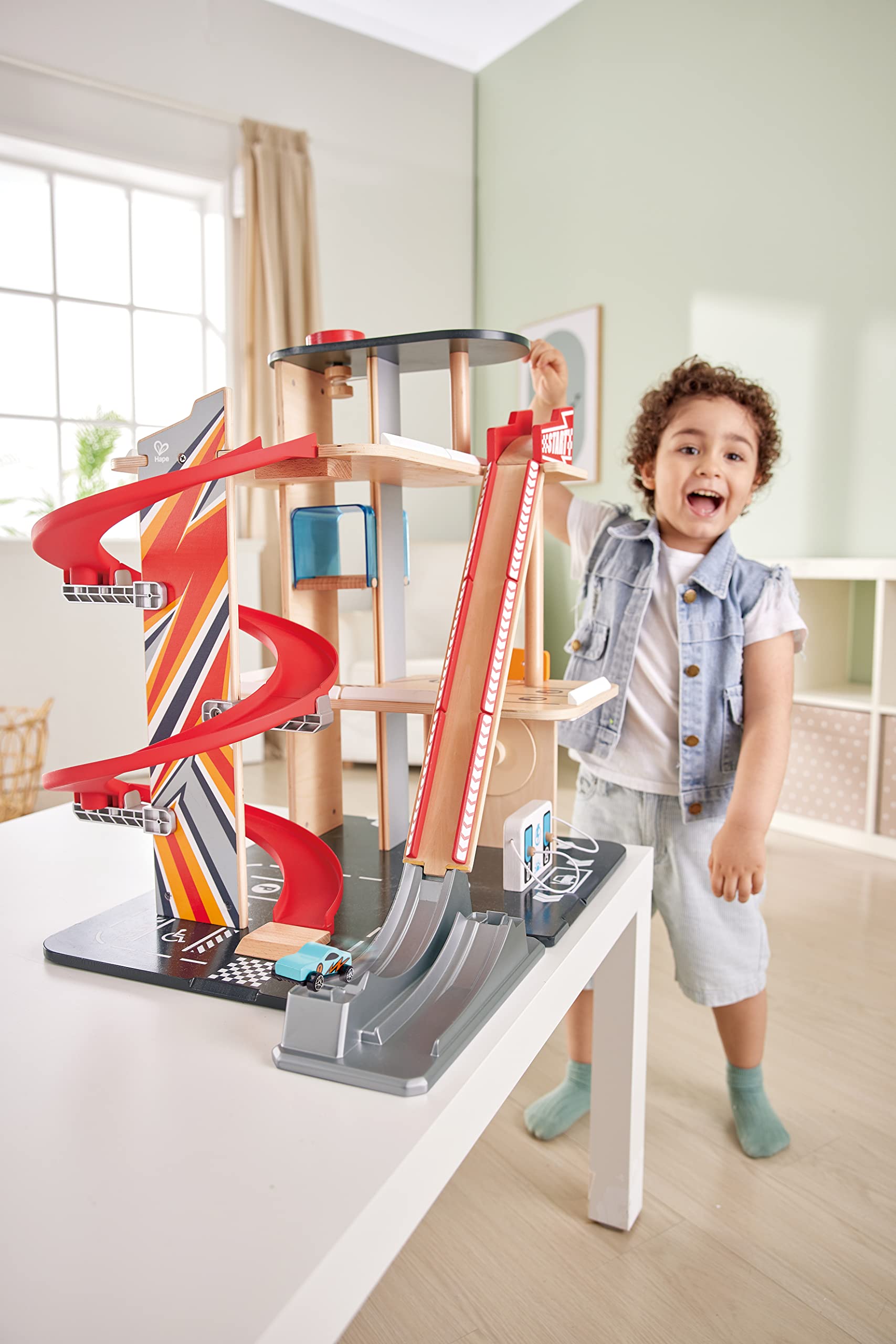Hape Gearhead Stunt Garage Kids Wooden Toy Car Parking Garage Playset w/Elevator and 2 Exit Tracks, Detachable Loop, Includes 2 Wooden Toy Racecars