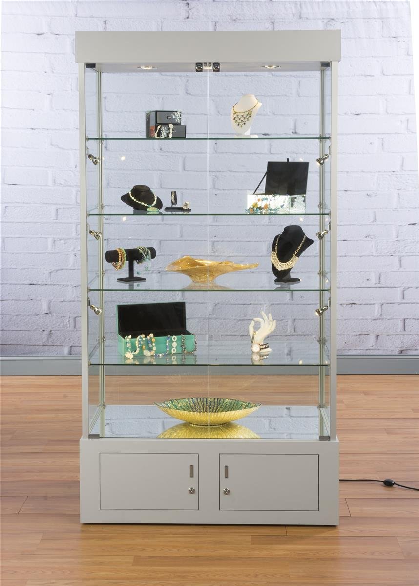 Displays2go, Tall Glass Showcase, Aluminum, Tempered Glass, Melamine – Silver, Clear (SMPLTW02SV)