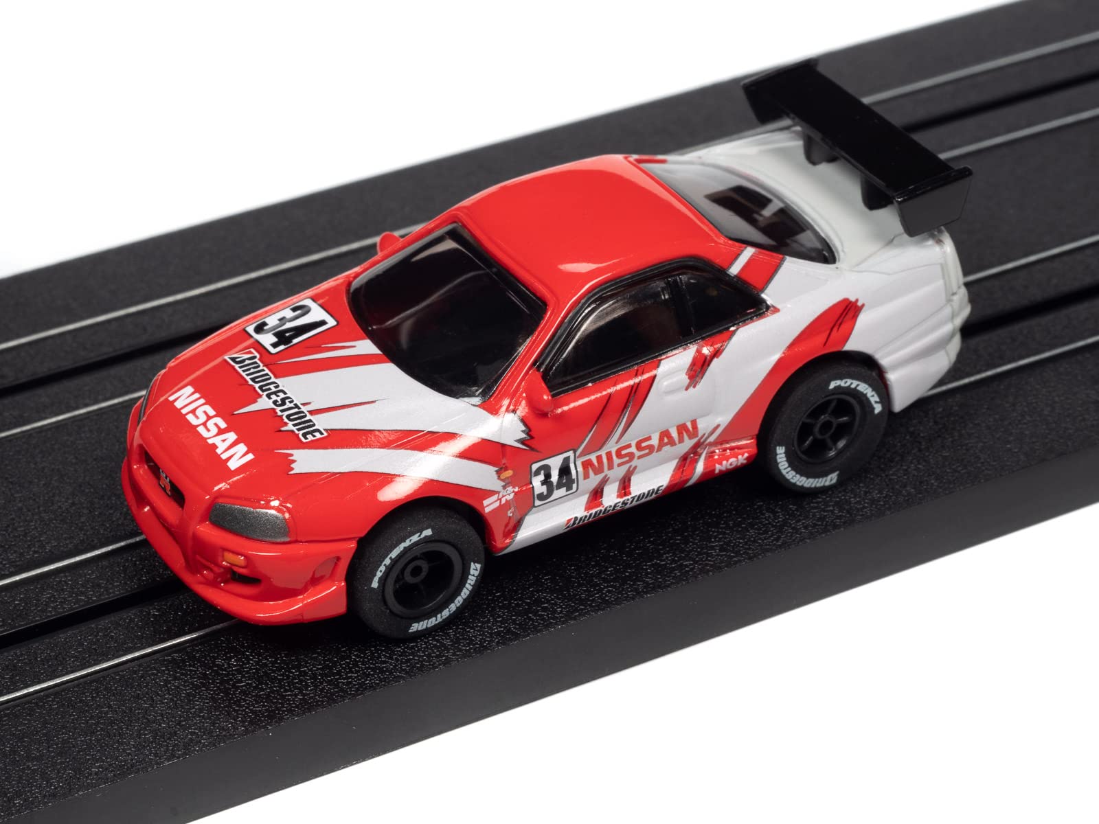 Auto World Xtraction Import Heat 1999 Nissan Skyline GTR (Red/Gray) HO Scale Slot Car