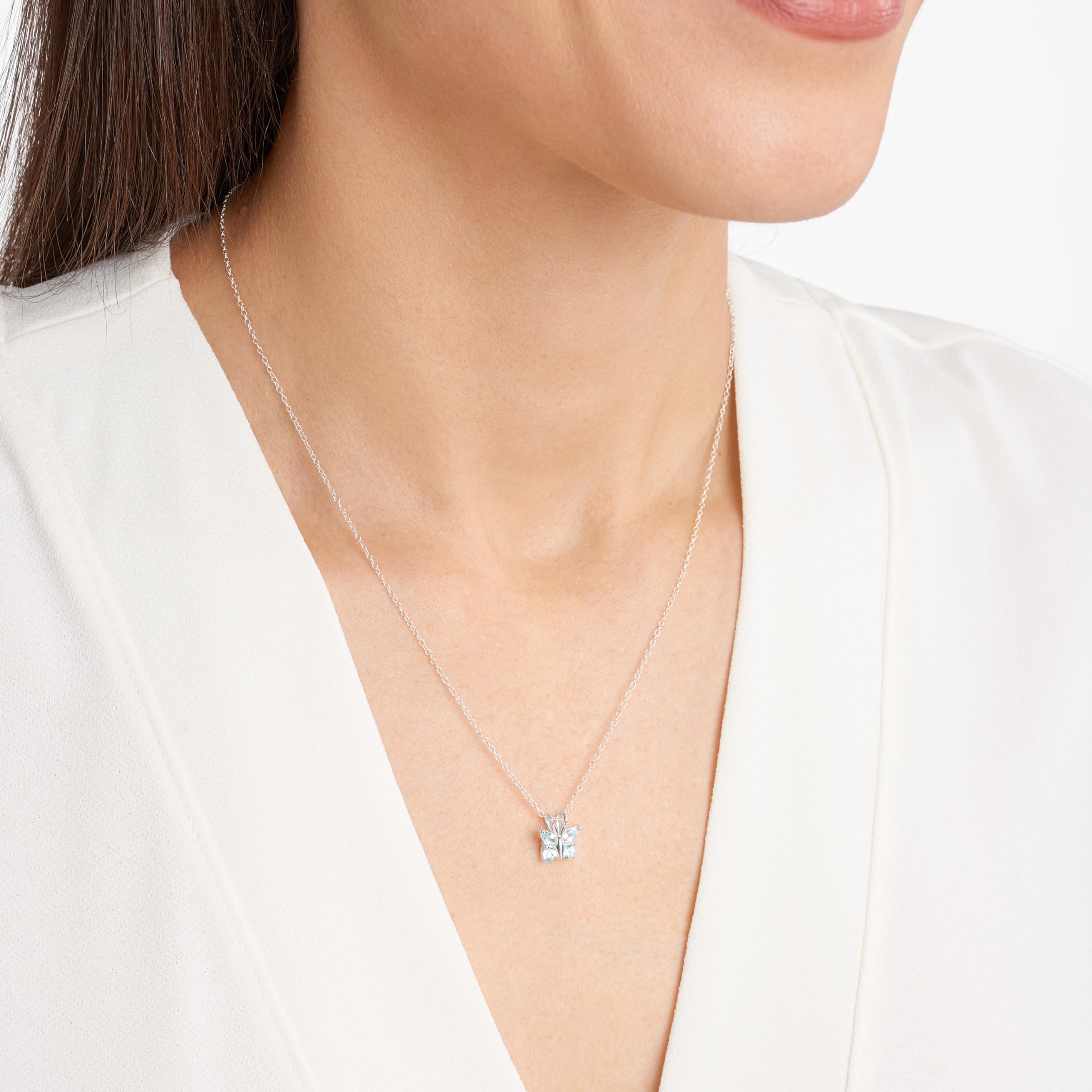 Amazon Essentials women Sterling Silver Genuine Sky Blue Topaz Butterfly Pendant Necklace, 18" (previously Amazon Collection)
