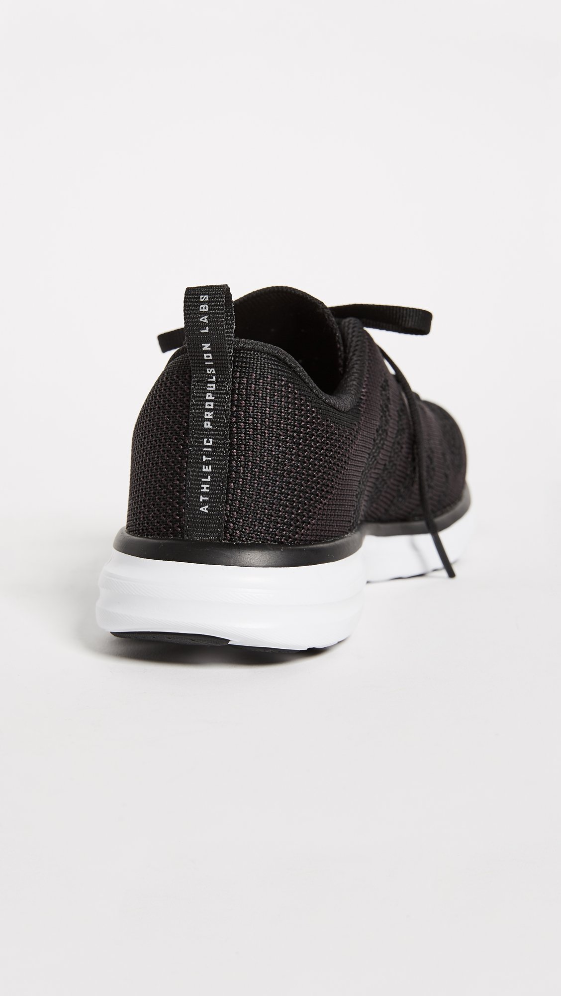 Athletic Propulsion Labs (APL) Women's Techloom Pro Sneaker, Black/White/Black, 6.5
