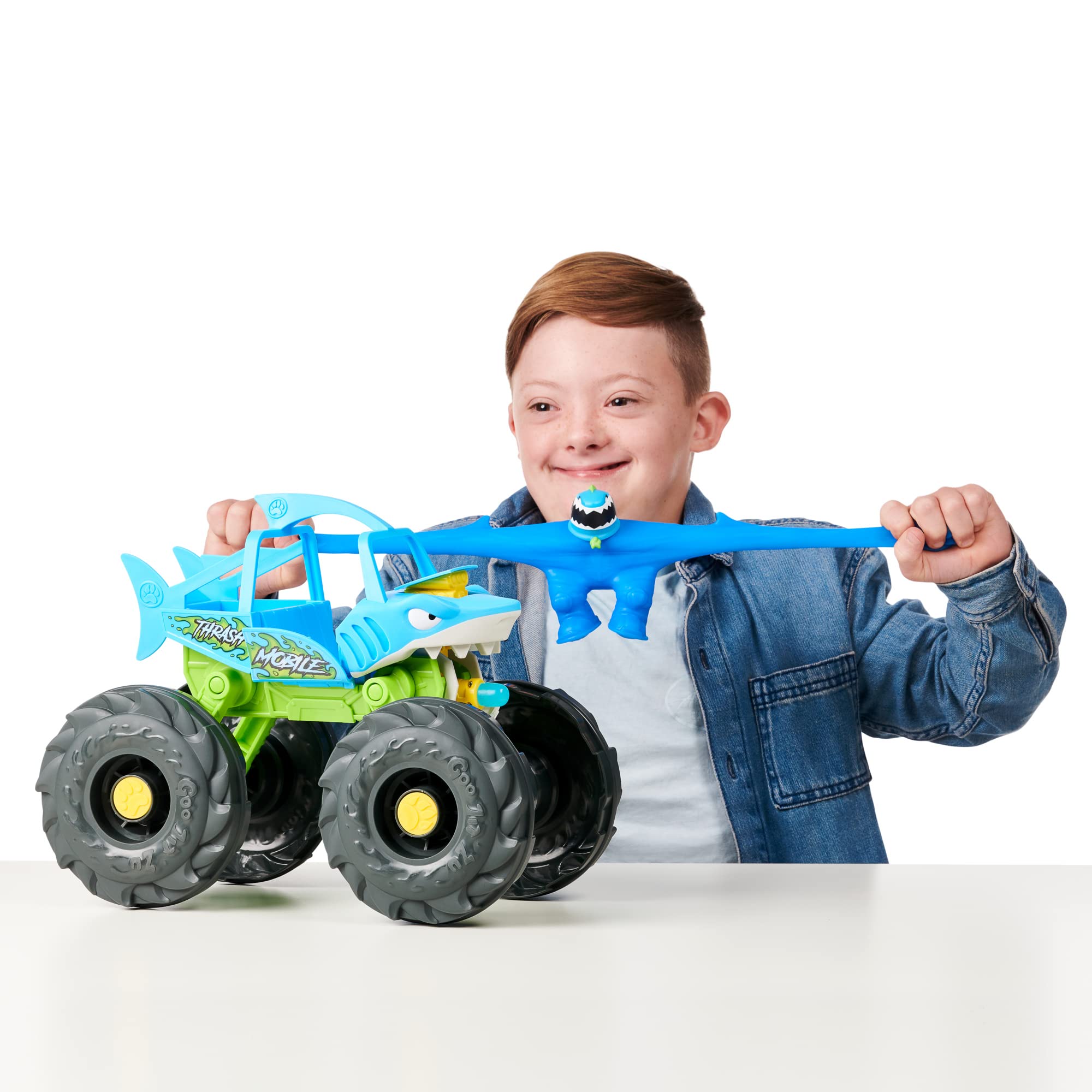 Heroes of Goo Jit Zu "Stretch and Strike Thrash Mobile! Vehicle with Missile Launcher and Stretchy, Goo Filled Exclusive Race Suit Thrash.