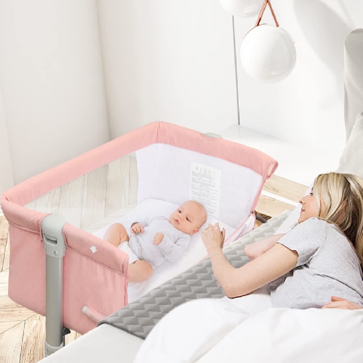 INFANS Baby Bassinet Bedside Crib, Newborn Bedside Sleeper Crib for Infants, Adjustable Height, Breathable Mesh, Detachable Washable Mattress, Portable Bassinet with Carrying Bag (Pink)