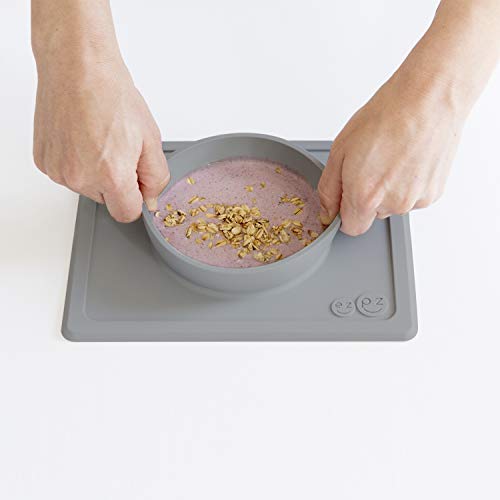 ezpz Mini Bowl - 100% Silicone Suction Bowl with Built-in Placemat for Infants + Toddlers - Comes with a Reusable Travel Bag (Gray)