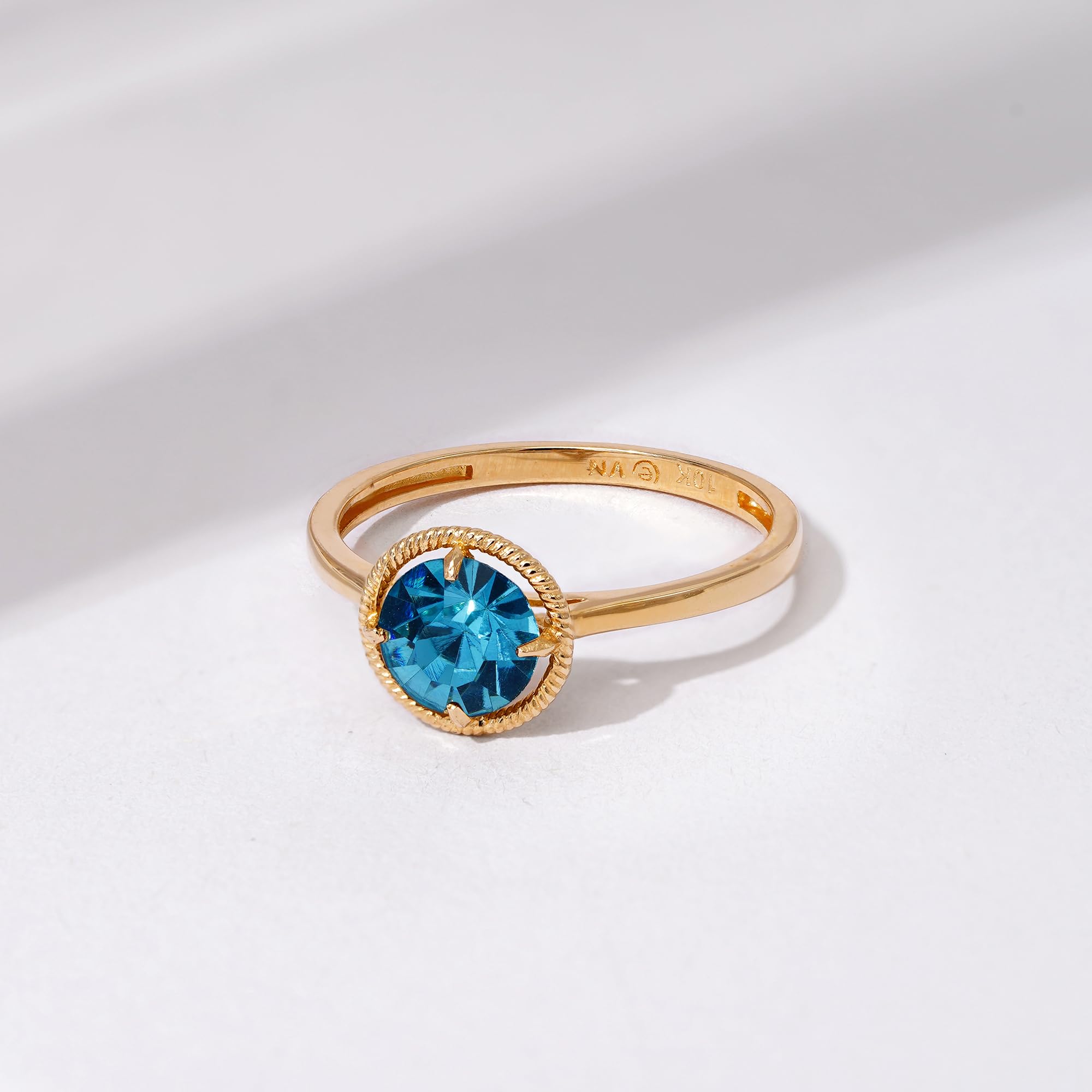 Amazon Essentials 10k Gold Imported Infinite Elements Crystal March Birthstone Ring, Size 6 (previously Amazon Collection)
