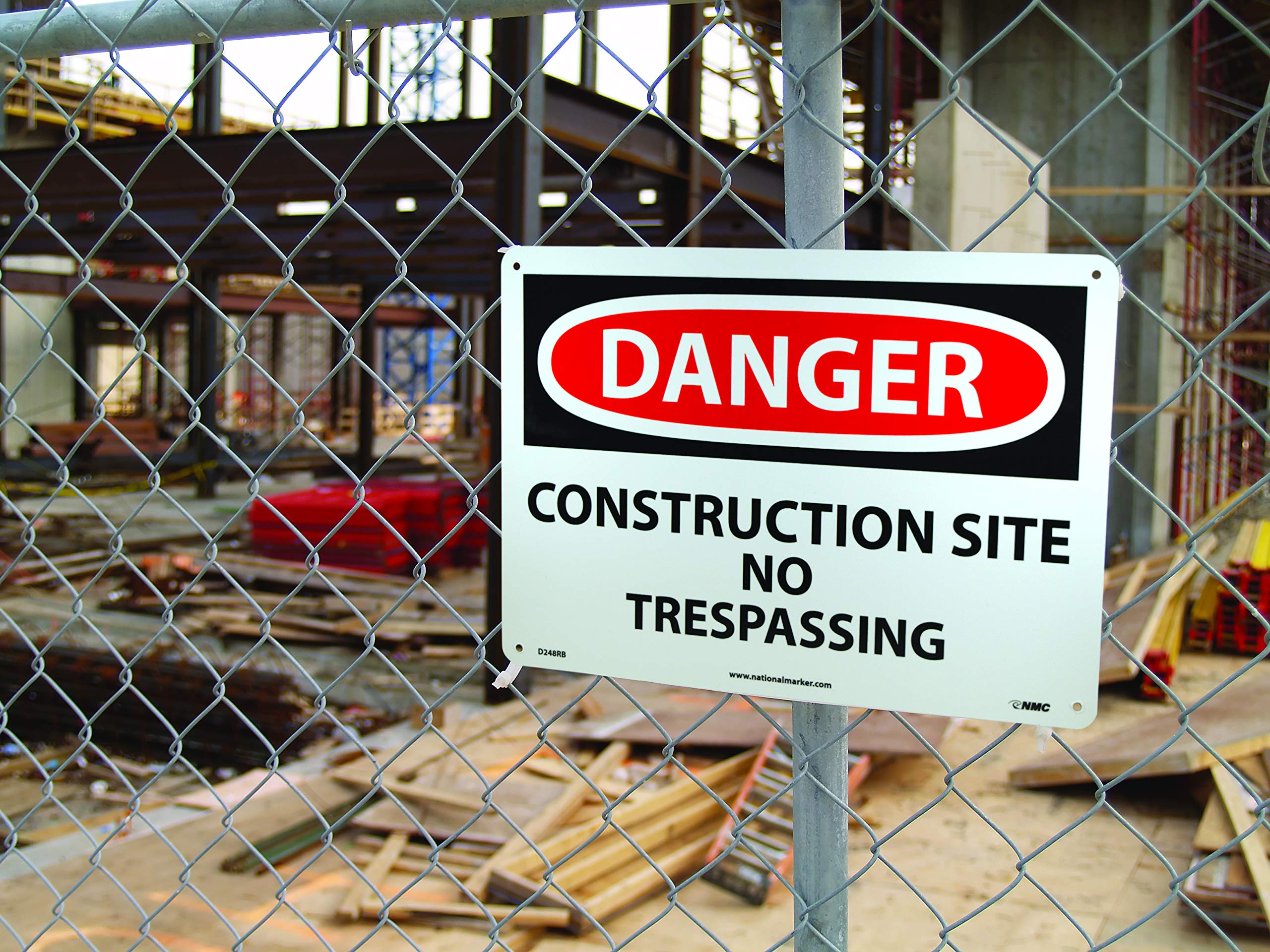 NMC D248RB DANGER - CONSTRUCTION SITE NO TRESPASSING Sign - 14 in. x 10 in. Rigid Plastic Danger Signage, Black/White Text on White/Red Base