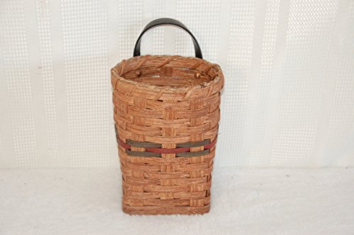 Hand Woven Utensil Wall Hanging Basket. This Cute Basket Is Handmade Locally Here in Ohio By the Local Amish. It Is a Very Handy Basket That Allows You to Store Your Utensils in a Basket on the Wall Saving Space on Your Counters. Measures: 4" X 3" X 8" Ta