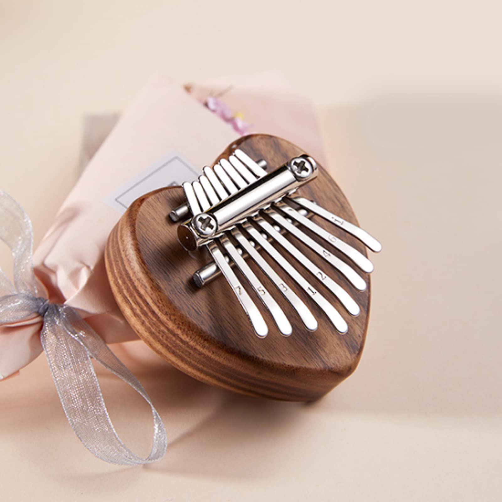 ANXVERS 8 Key Kalimba Thumb Piano,Mini Thumb Piano, Delicate Finger Piano, Heart-Shaped Finger Piano Decompression, Music Accessories, Pendant Gifts, Portable Mini Piano for Children and Beginners