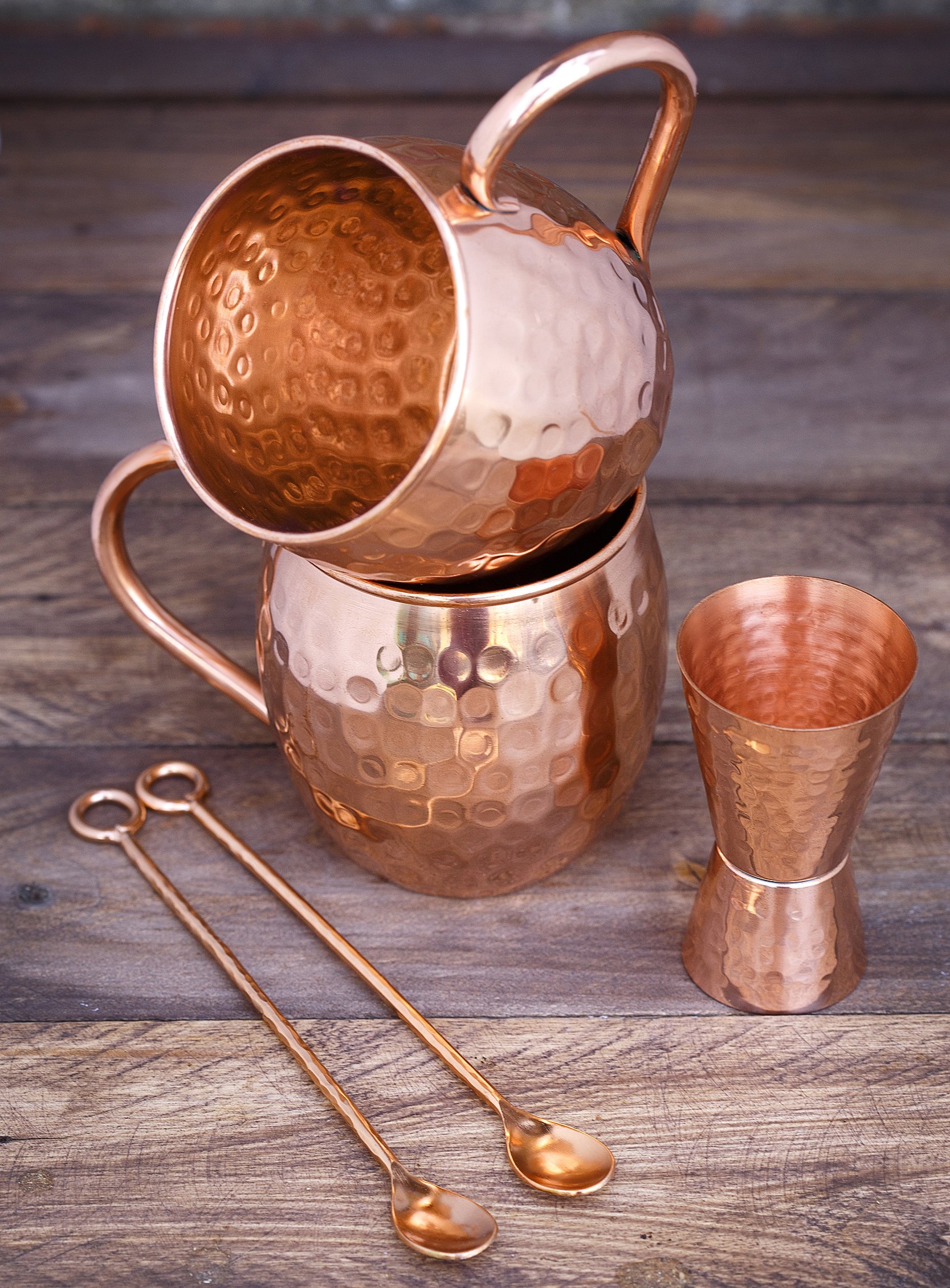 Copper jigger lacquered for the shine and to prevent tarnish. - Double 1oz/2oz copper measuring jigger for cocktail mixing. - Solid hammered copper 22G copper. - Copper shot glass for Moscow mule.
