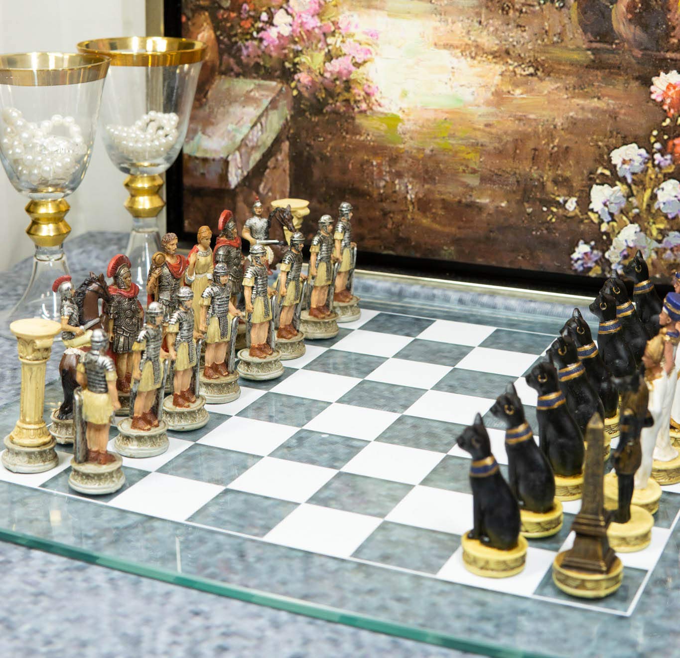 Ebros Gift Historical Themed Chess Set Egyptian Ptolemaic Pharaoh Army VS Augustus Caesar Roman Empire Centurions Resin Sculpted Chess Pieces with Checker Frosted Glass Board Gaming Set