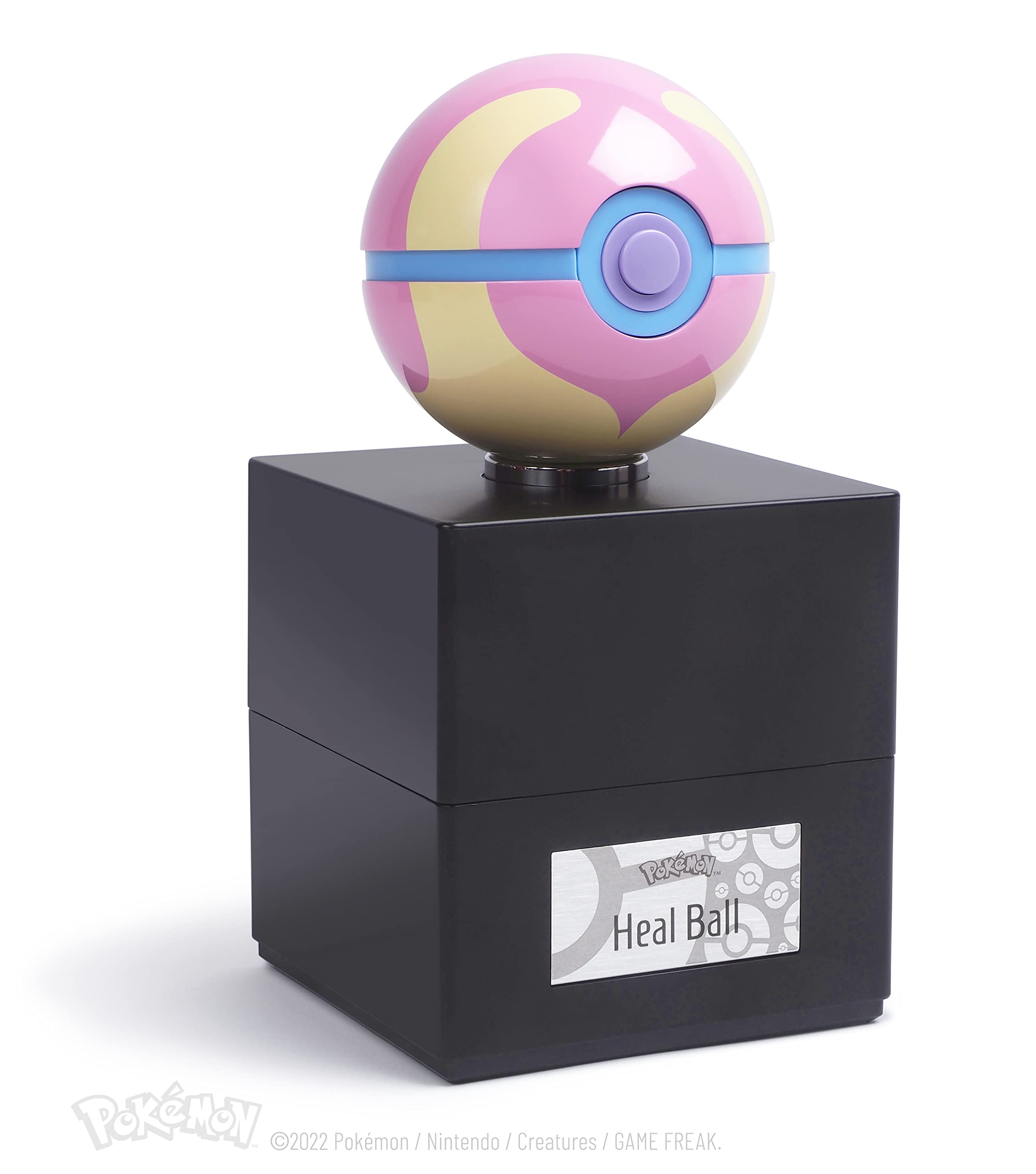 Pokémon Poké Ball Authentic Replicas - Realistic, Electronic, Die-Cast Poké Ball with Display Case Light Features - by The Wand Company (Heal Ball)
