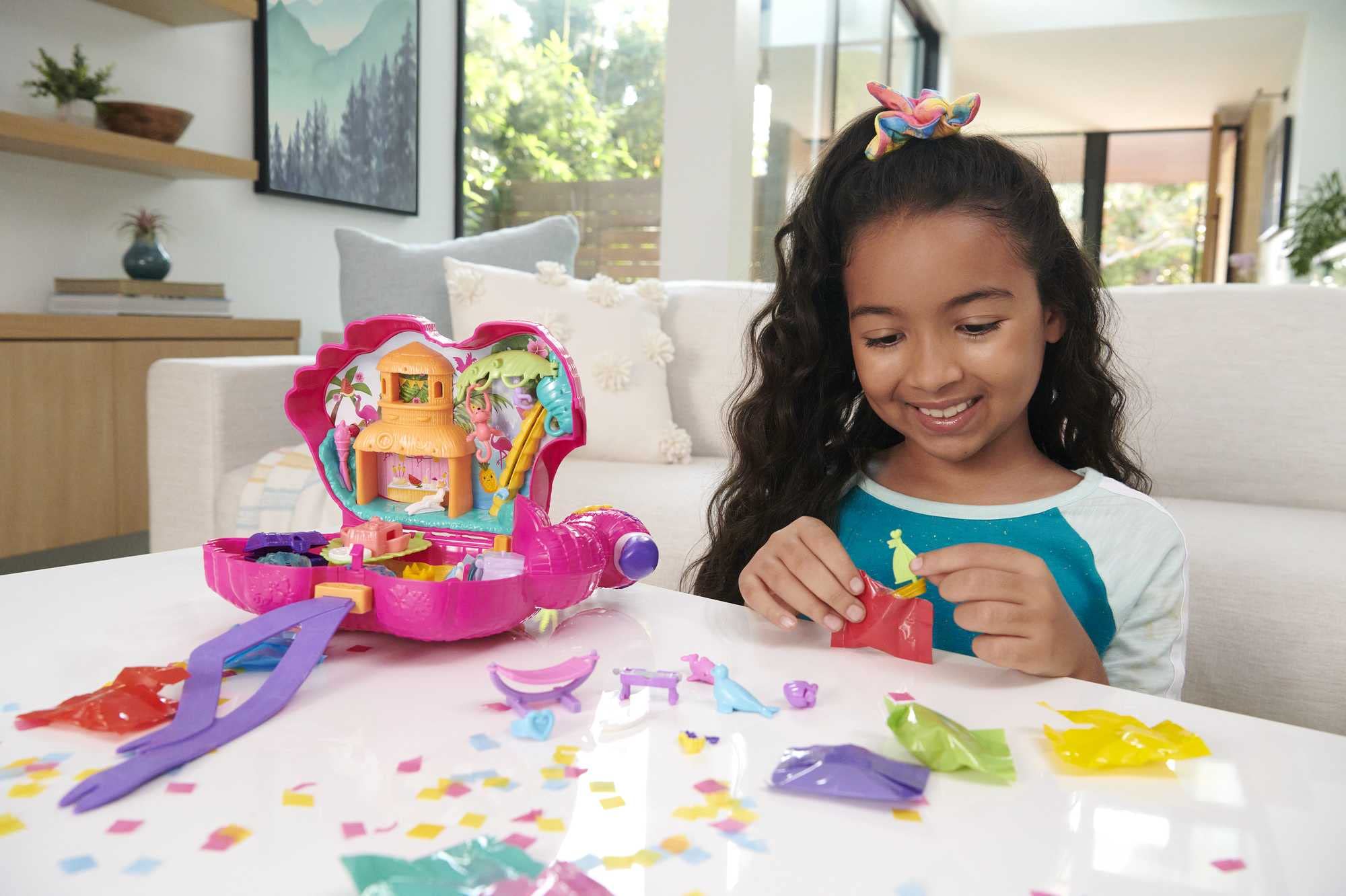 Polly Pocket Flamingo Party Large Compact Playset with 26 Surprises (Including Micro Margo & Friend Dolls), Pop & Swap Feature, Tropical Party Play Areas: Palm Tree Slide & Swing; Banquet; Water Area