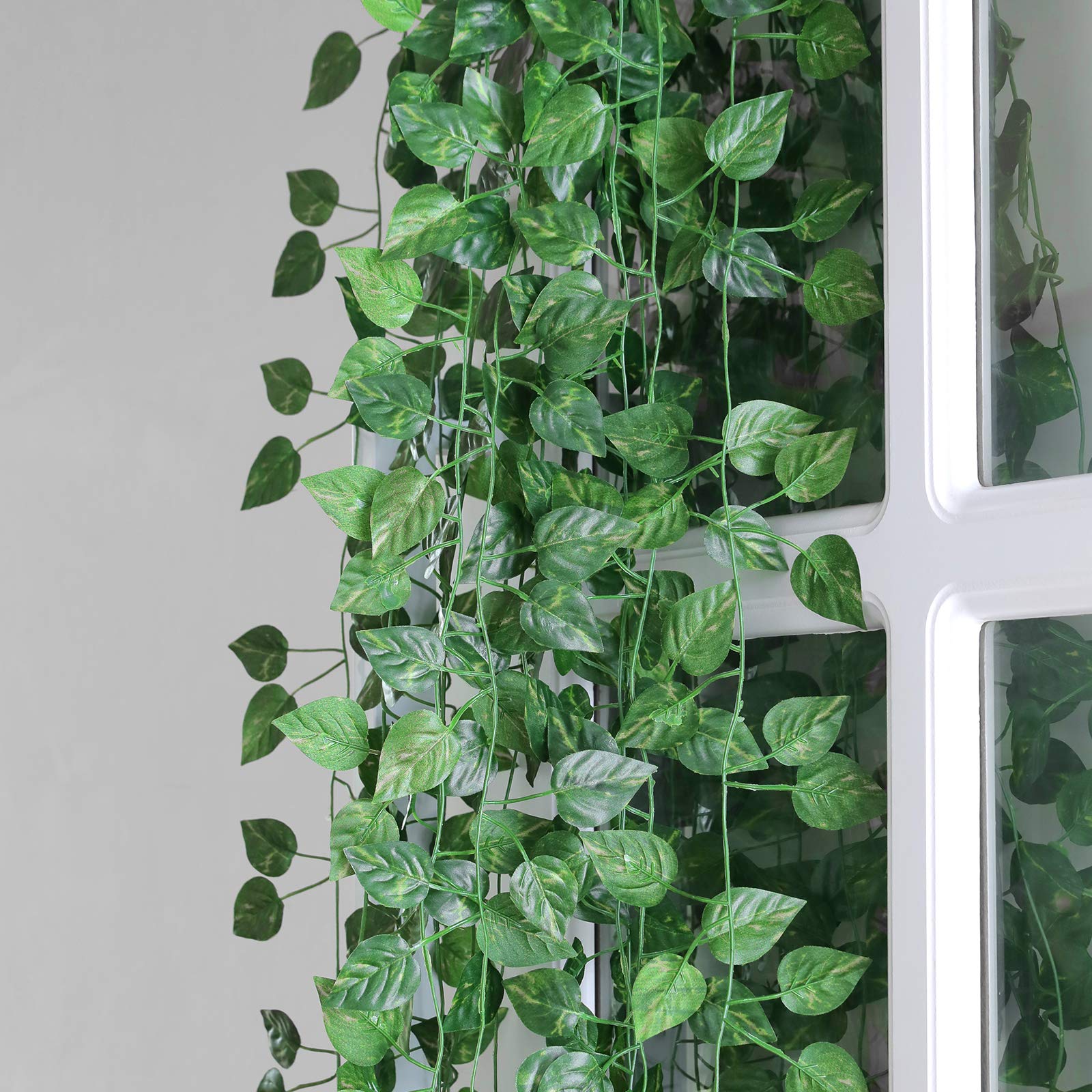ZHIIHA 12 Strands 90.5 Ft Artificial Scindapsus Leaf Plants Vine Hanging Garland Fake Foliage Plants for Home Kitchen Garden Office Wedding Wall Decoration