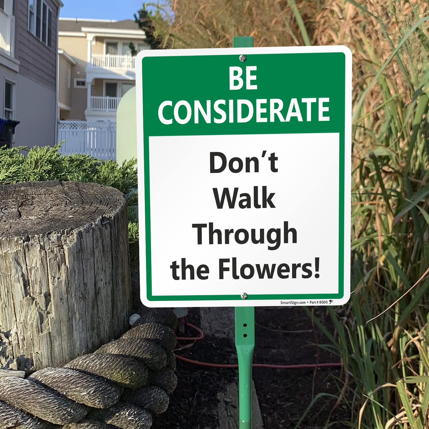 SmartSign 12 x 10 inch “Be Considerate - Don’t Walk Through The Flowers” LawnBoss Yard Sign with 3 foot Stake, 40 mil Laminated Rustproof Aluminum, Green, Black and White, Set of 1, Made in USA