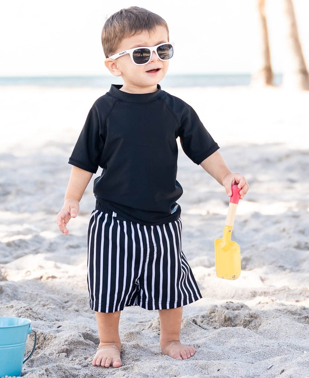 RuffleButts Kids Sunglasses Impact-Resistant Polycarbonate Lenses with 100% UVA/UVB Protection and Flexible BPA-Free Frames - White - 2-5T