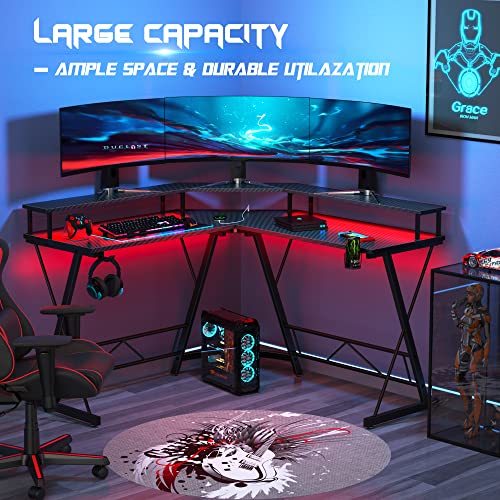 HYTXEN Gaming Desk with Led Lights, L Shaped Corner Computer Desk with Power Strip, Carbon Fiber Surface Gaming Table with Monitor Stand&Cup Holder, Headphone Hook, Graphite Black