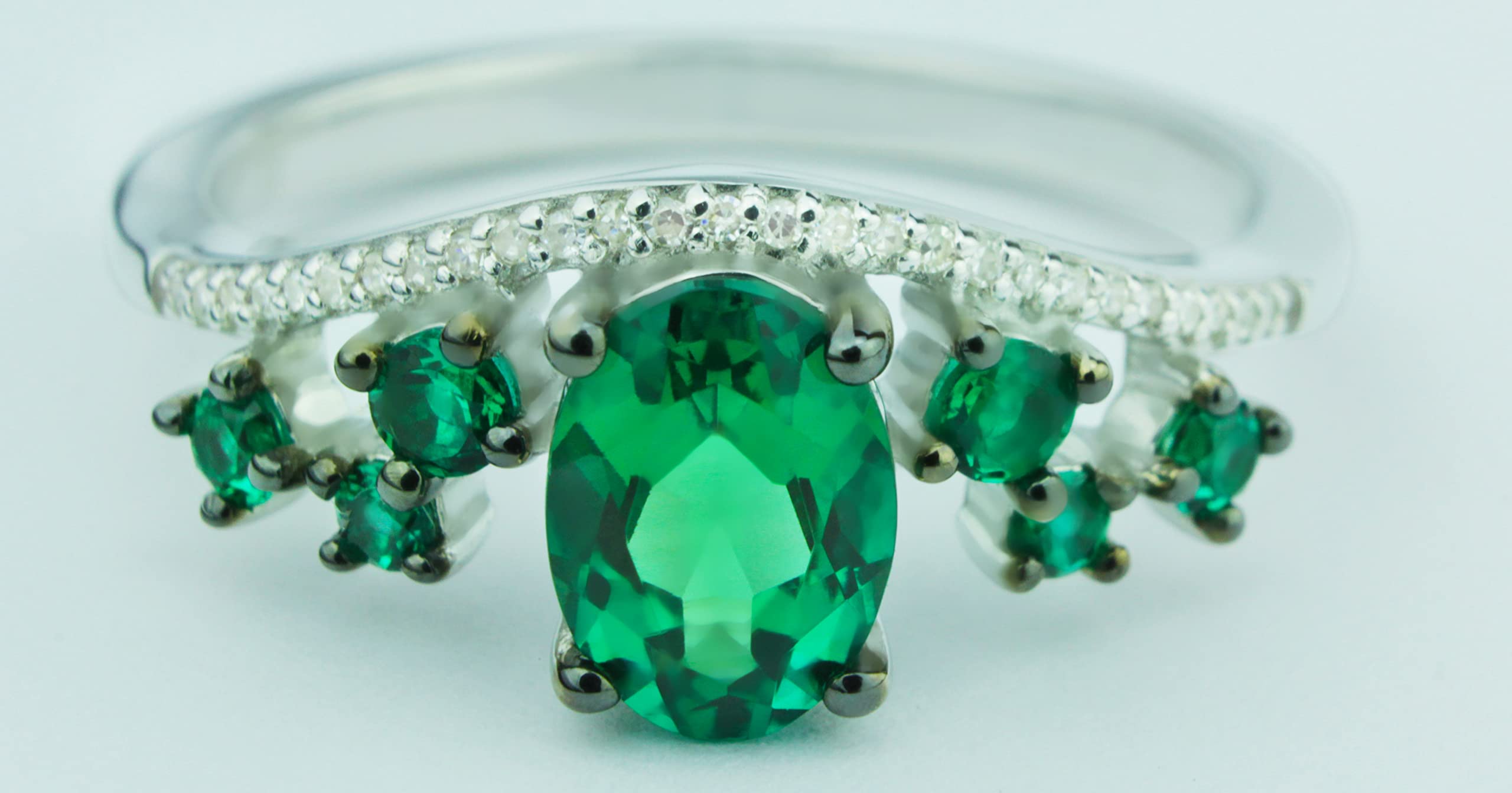 Belantina Heartland By Beverley Mitchell .925 Sterling Silver 7x5mm Oval Cut Lab-Created Emerald & Diamond Accented Curved Statement Ring (H-I, I2-I3) - Size 7