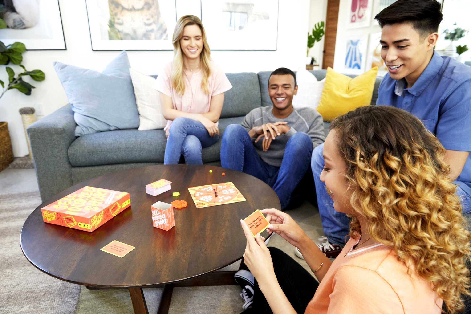 Mattel Games Sell Yourself Short, Hilarious Party Game for Adults and Teens, with Spinner, 112 Cards and 41 Tokens, Makes a Great Gift for 14 Year Olds and Up