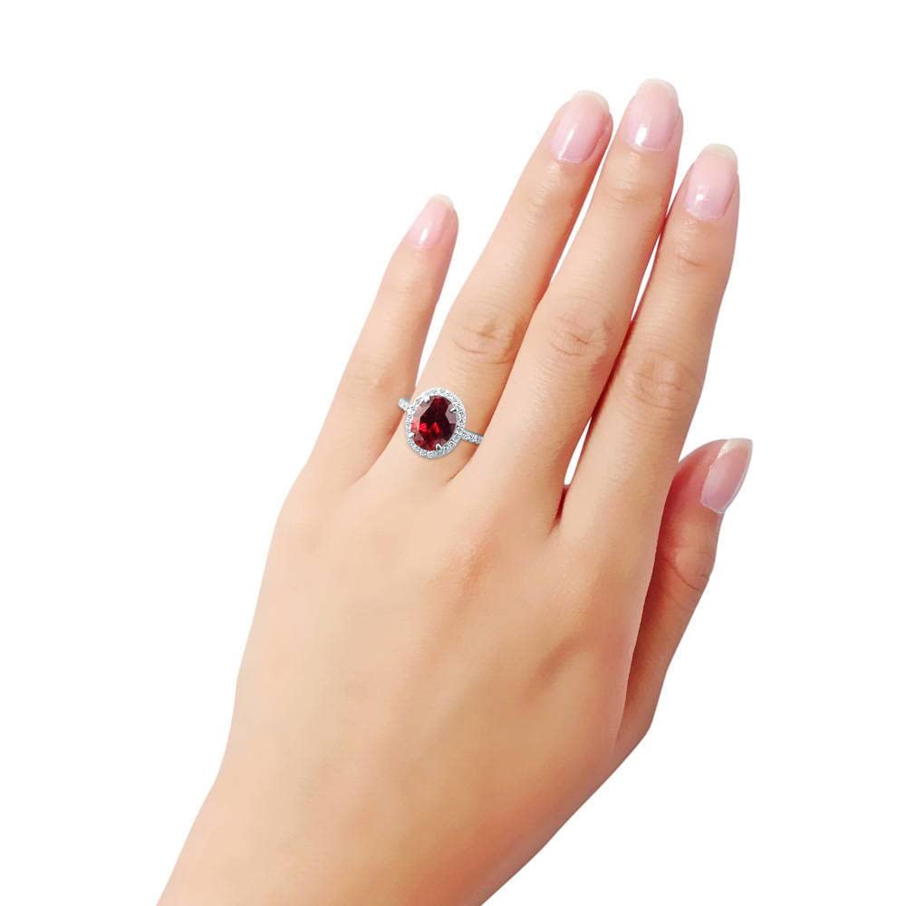BERRICLE Sterling Silver Halo Wedding Engagement Rings Simulated Ruby Oval Cut Cubic Zirconia CZ Ring for Women, Rhodium Plated Size 9
