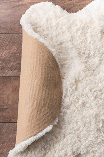 nuLOOM Hand Tufted One and a Half Piece Faux Sheepskin Accent Rug, 2' x 4' 5", Natural