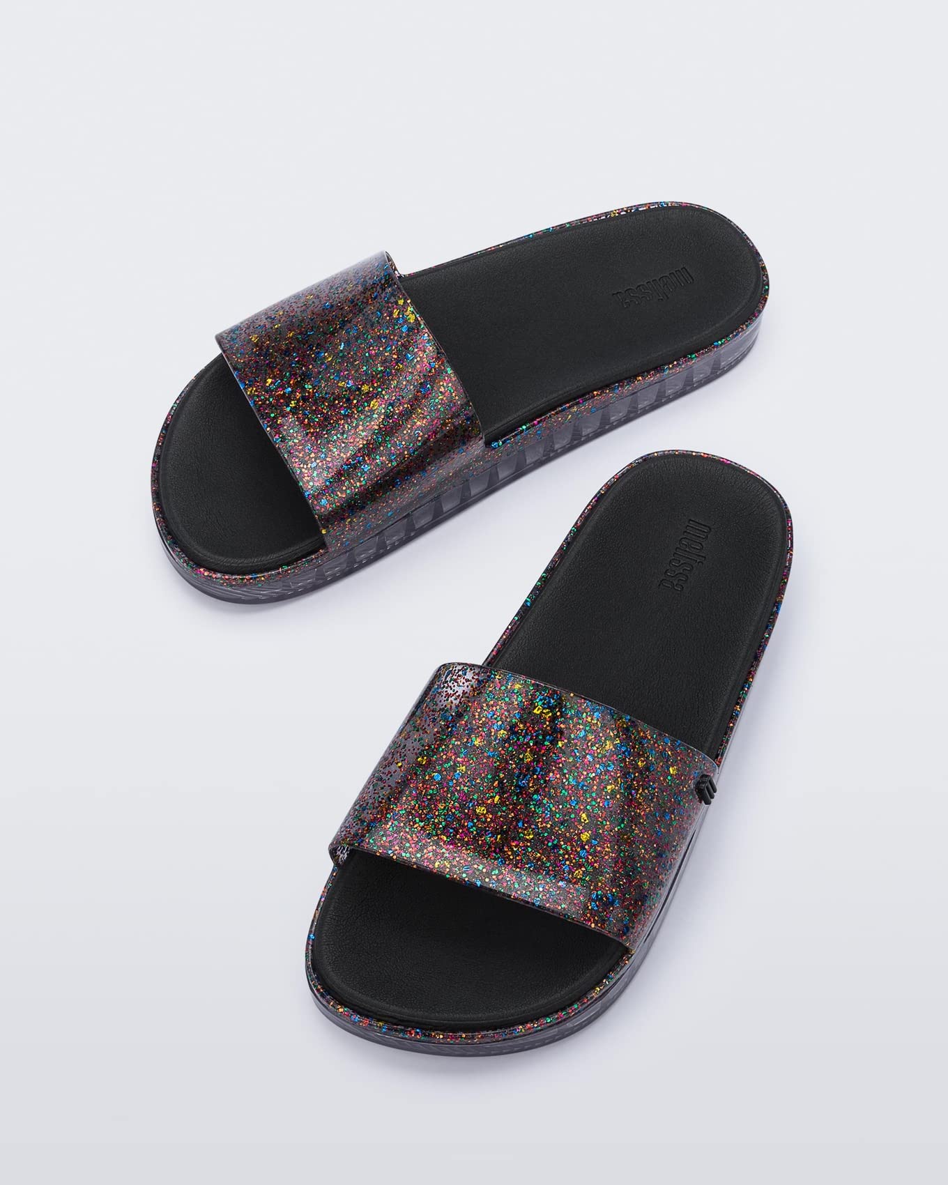 Melissa Next Gen Beach Jelly Slides for Women - Super Soft and Flexible, Stylish Slip-on Vegan Jelly Sandals, Flip Flops with Open Toe Design, Glitter/Clear, 8