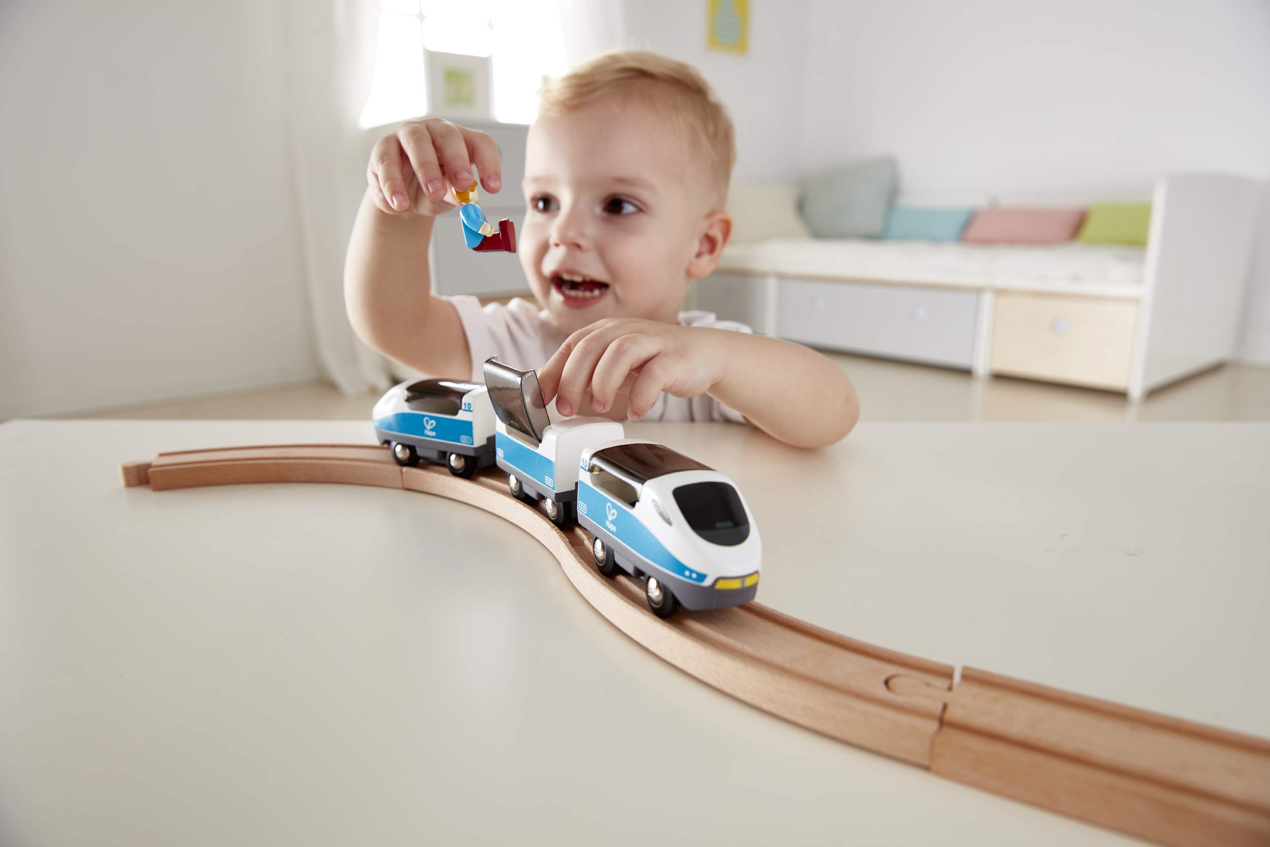 Hape E3728 Intercity Train Toy, Kids Train Toy Set with Accessories, 3 x Open/Close Magnetic Carriages, Passenger and Driver Figurines Included, Multicolor, 10.63" x 1.5" x 1.97", 7 Pack