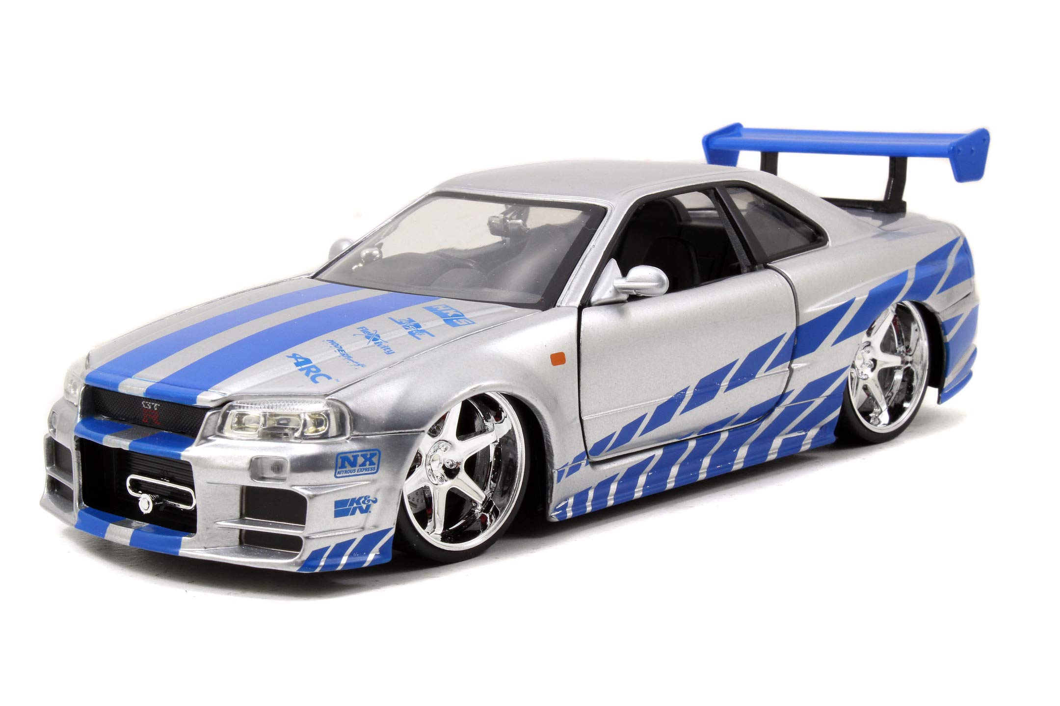 Jada Fast & Furious Coche Nissan Skyline Gt R R34 2002, Escala 1:24 + A Todo Gas Vehículo 1/24 1995 Toyota Supra
