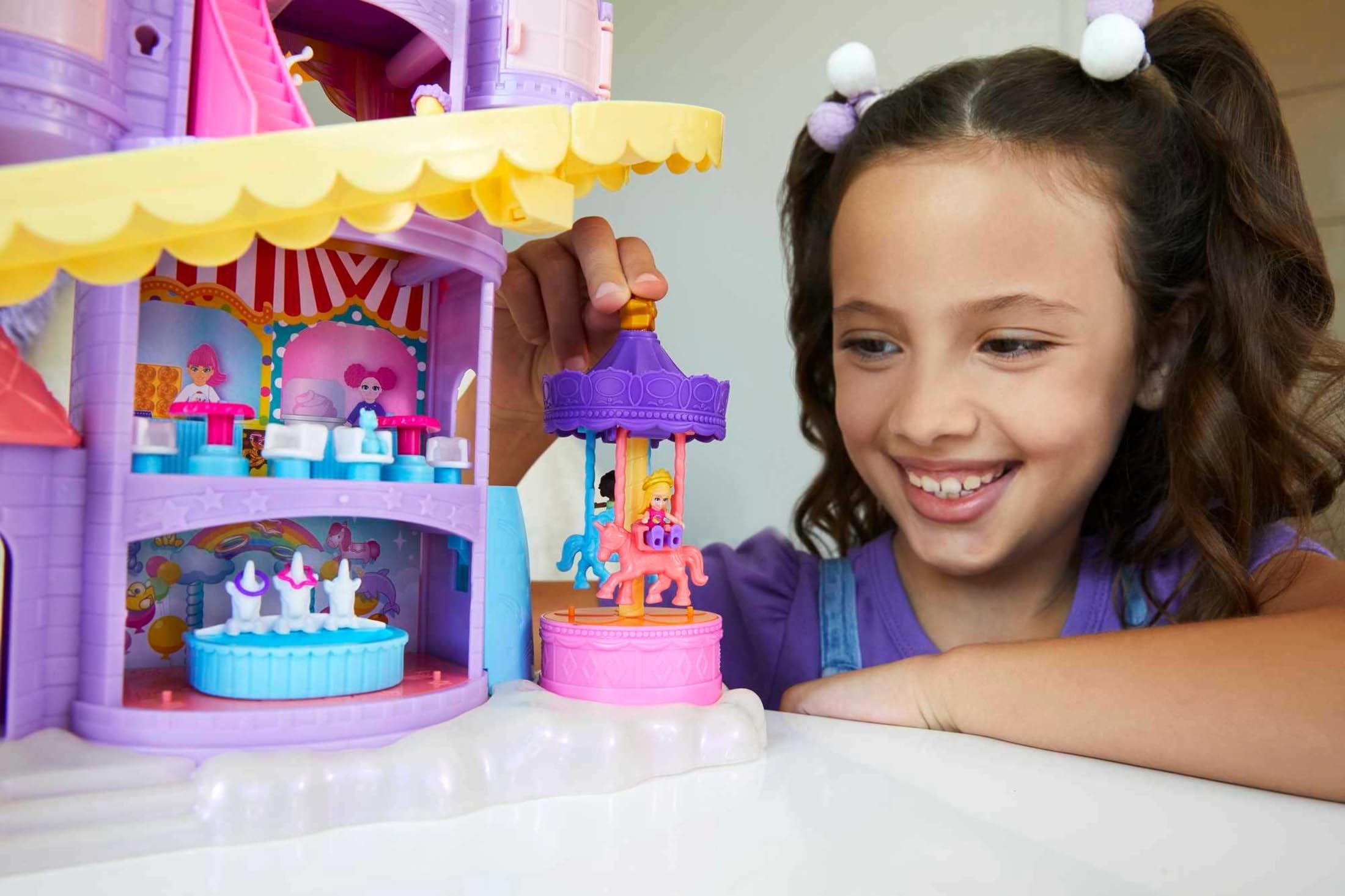 Polly Pocket Dolls & Playset, Rainbow Funland Theme Park with 2 Unicorns, Polly & Shani Micro Dolls, 25 Surprise Accessories