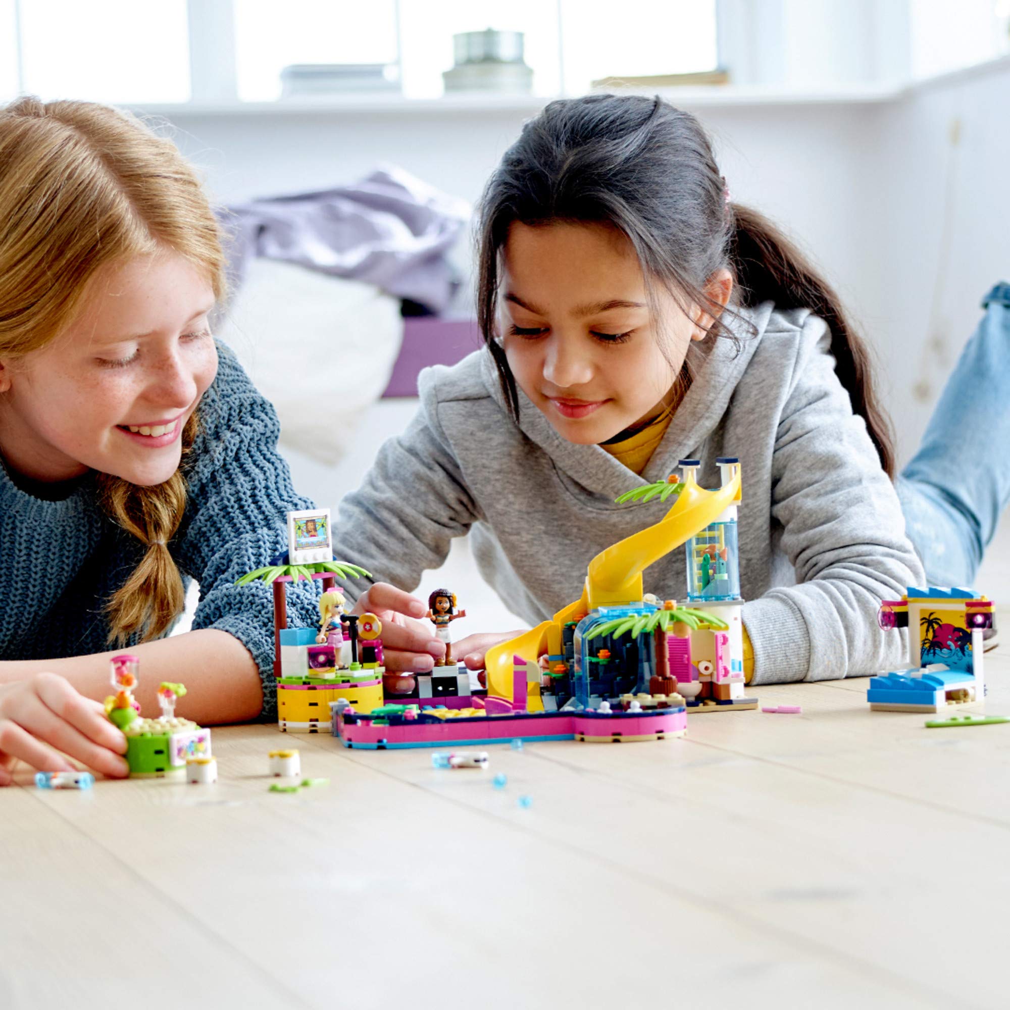 LEGO Friends Andrea's Pool Party 41374 Toy Pool Building Set with Andrea and Stephanie Mini Dolls for Pretend Play, Includes Toy Juice Bar and Wave Machine (468 Pieces)