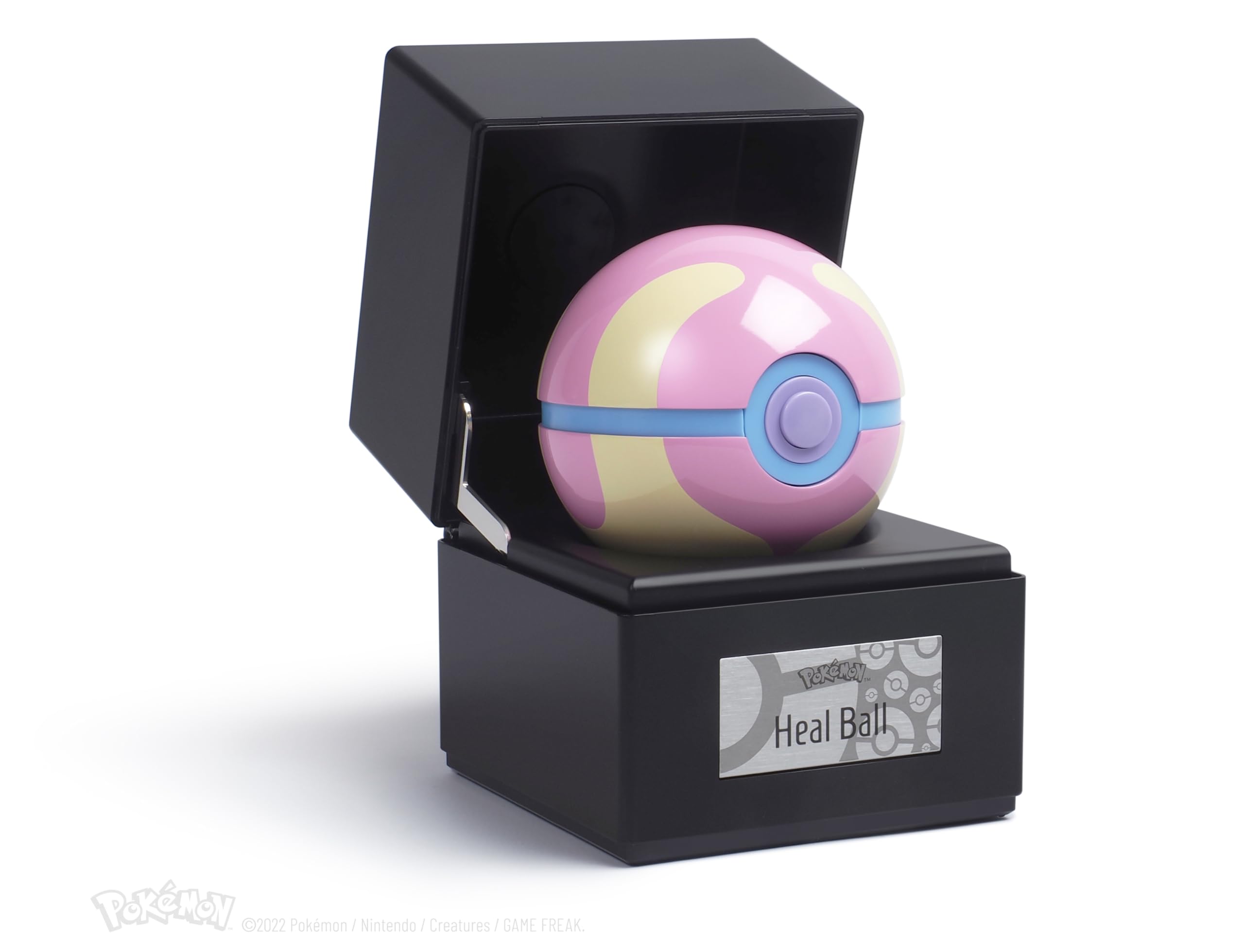 Pokémon Poké Ball Authentic Replicas - Realistic, Electronic, Die-Cast Poké Ball with Display Case Light Features - by The Wand Company (Heal Ball)