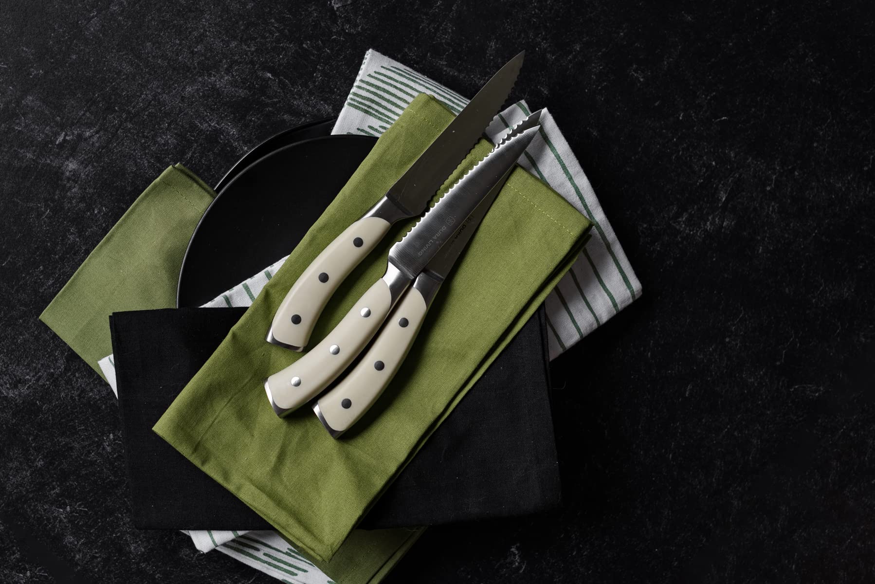 DURA LIVING 4-Piece Serrated Kitchen Steak Knife Set β Forged High Carbon Stainless Steel, Ultra Sharp, Ergonomic Black Handles, Durable Dinner Knives, Cream Handle