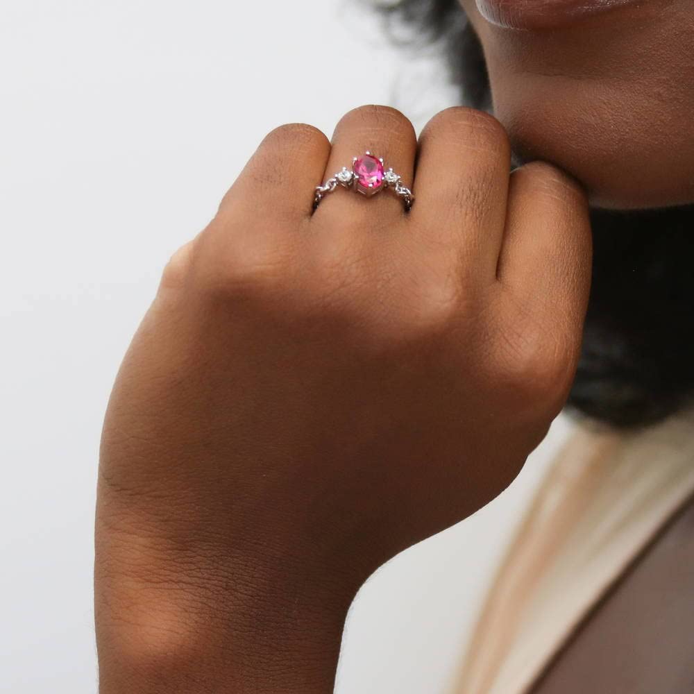 BERRICLE Sterling Silver 3-Stone Simulated Ruby Oval Cut Cubic Zirconia CZ Fashion Anniversary Chain Ring for Women, Rhodium Plated
