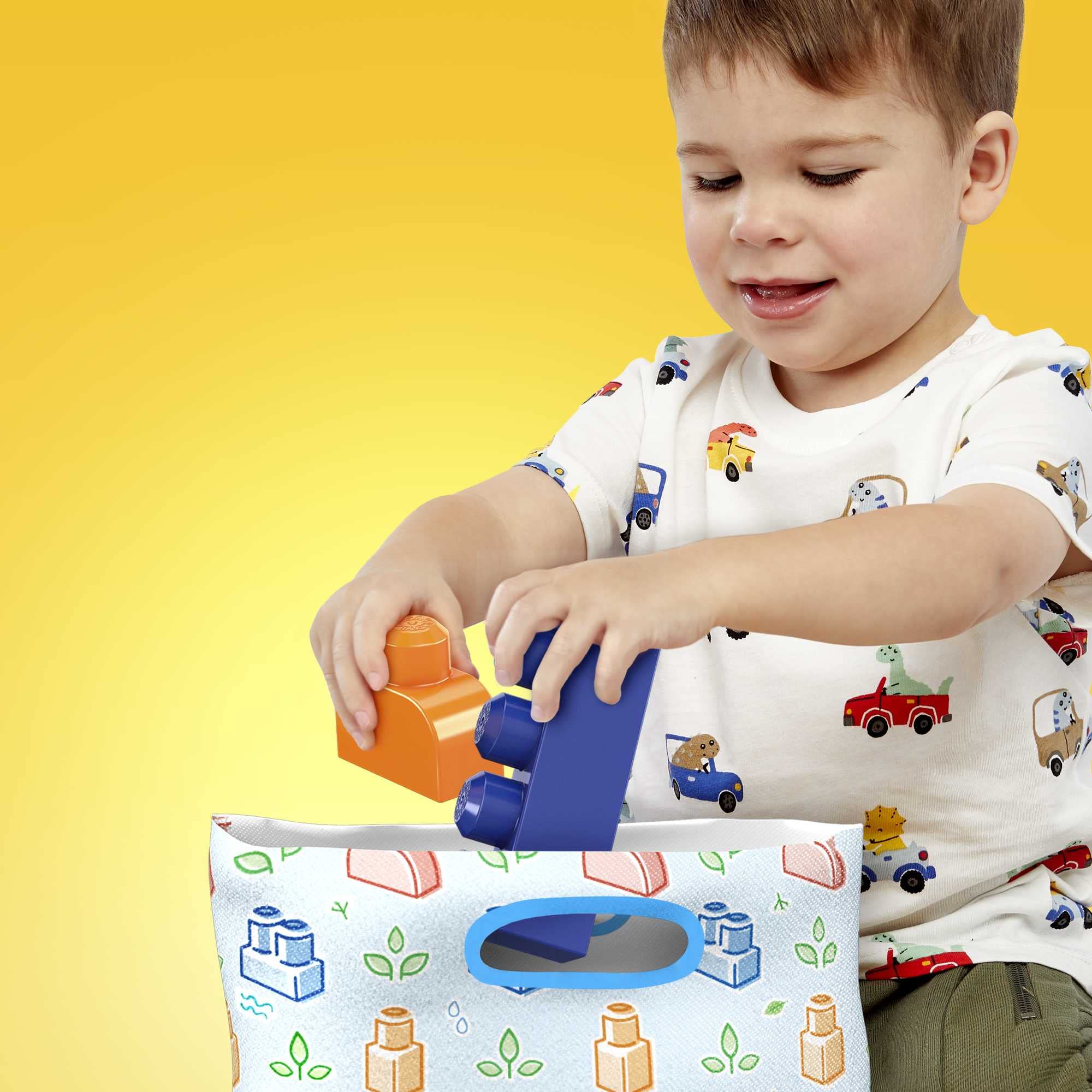 MEGA Bloks Fisher-Price Toddler Blocks Toys Set, Build ‘n Play Bag with 60 Plant-Based Pieces and Storage, Blue, Ages 1+ Years