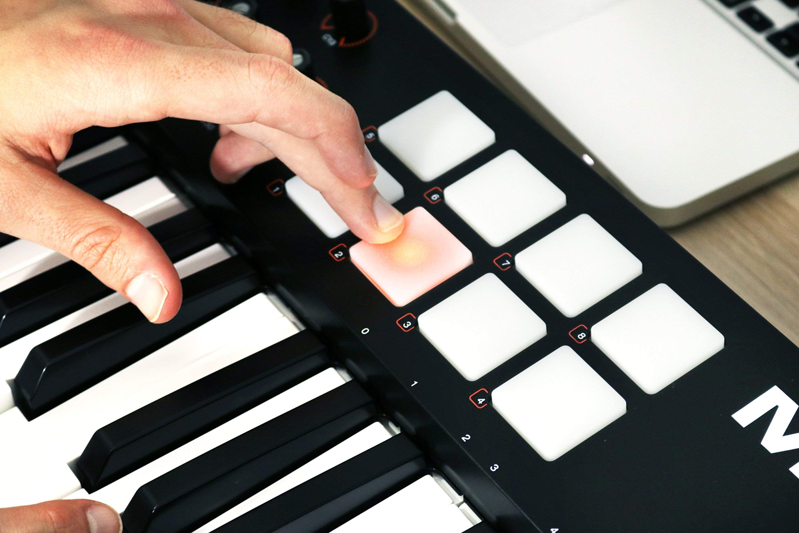 Oxygen 61 MK IV - 61-Key USB MIDI Drum Pad and Keyboard Controller (Renewed)