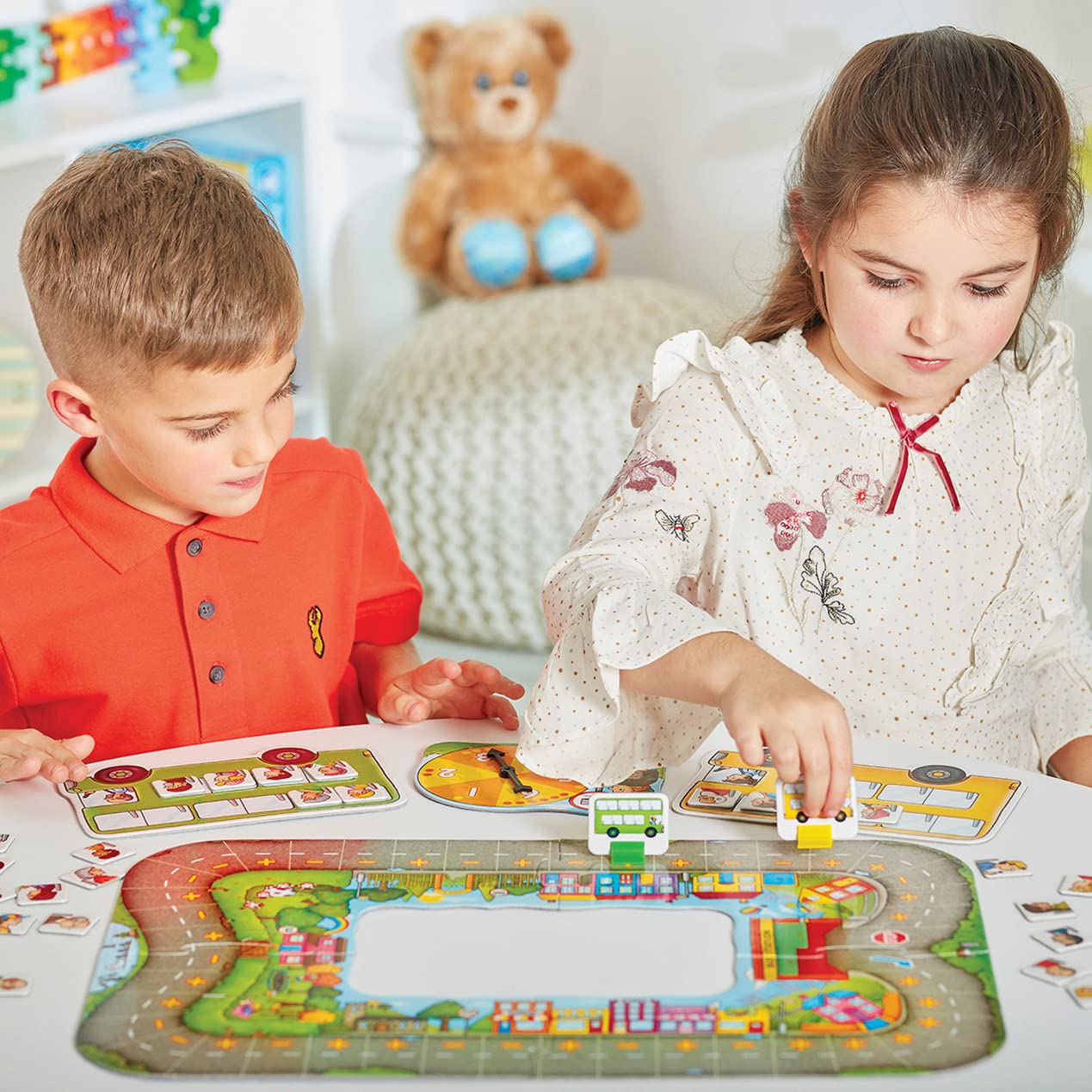 Orchard Toys Moose Games Bus Stop Game. A Fun Introduction to Addition and Subtraction. Pick up and Drop Off Passengers on Your Bus. for Ages 4-8 and for 2-4 Players
