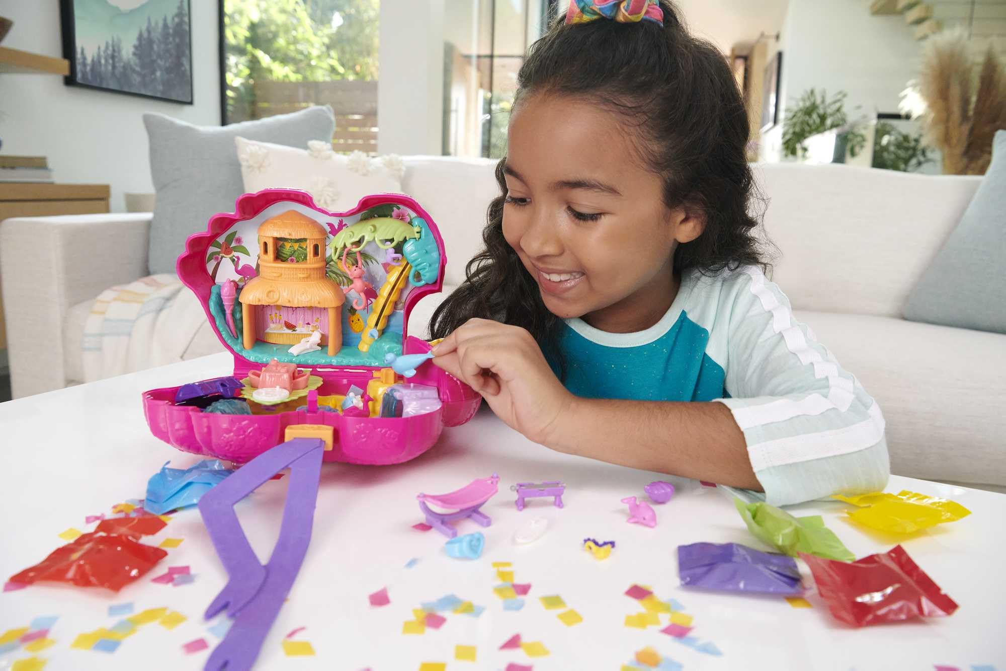 Polly Pocket Flamingo Party Large Compact Playset with 26 Surprises (Including Micro Margo & Friend Dolls), Pop & Swap Feature, Tropical Party Play Areas: Palm Tree Slide & Swing; Banquet; Water Area