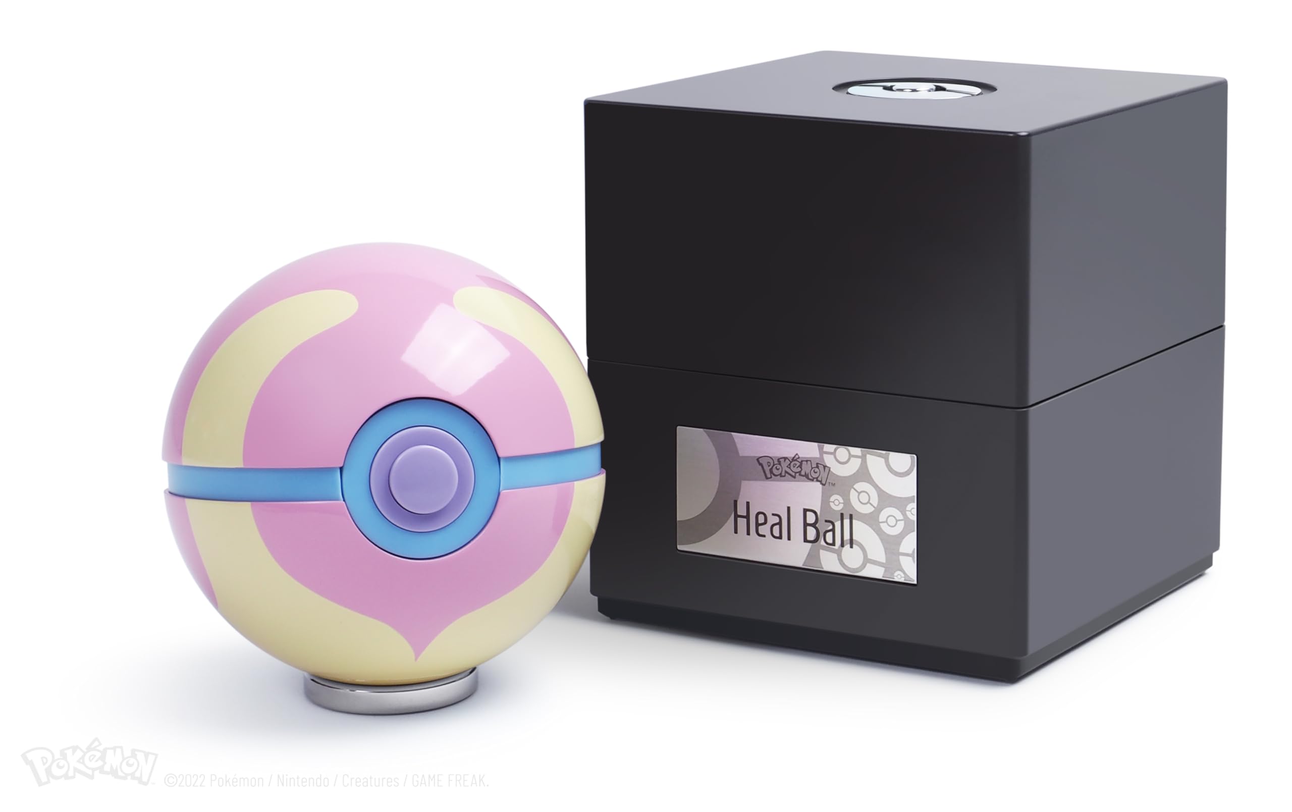 Pokémon Poké Ball Authentic Replicas - Realistic, Electronic, Die-Cast Poké Ball with Display Case Light Features - by The Wand Company (Heal Ball)