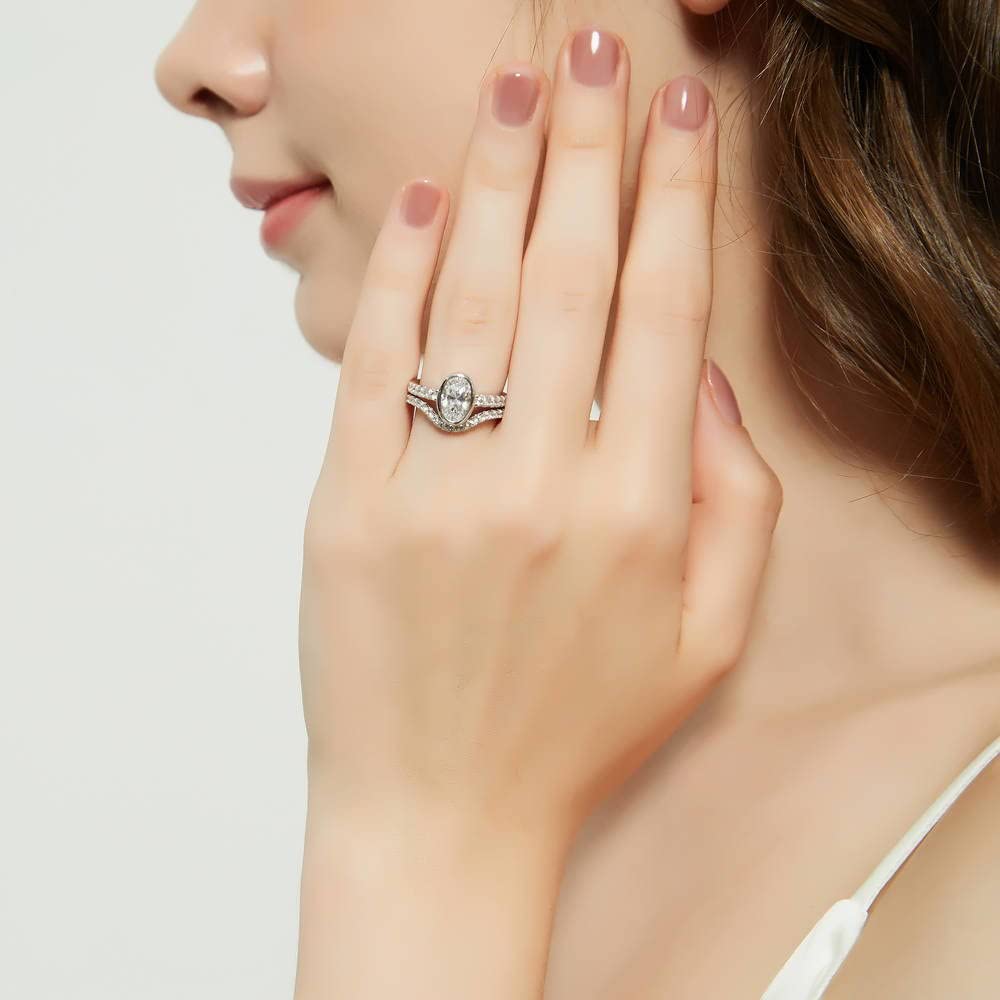 BERRICLE Sterling Silver Solitaire Wedding Engagement Rings 1.4 Carat Bezel Set Oval Cut Cubic Zirconia CZ Ring Set for Women, Rhodium Plated Size 7