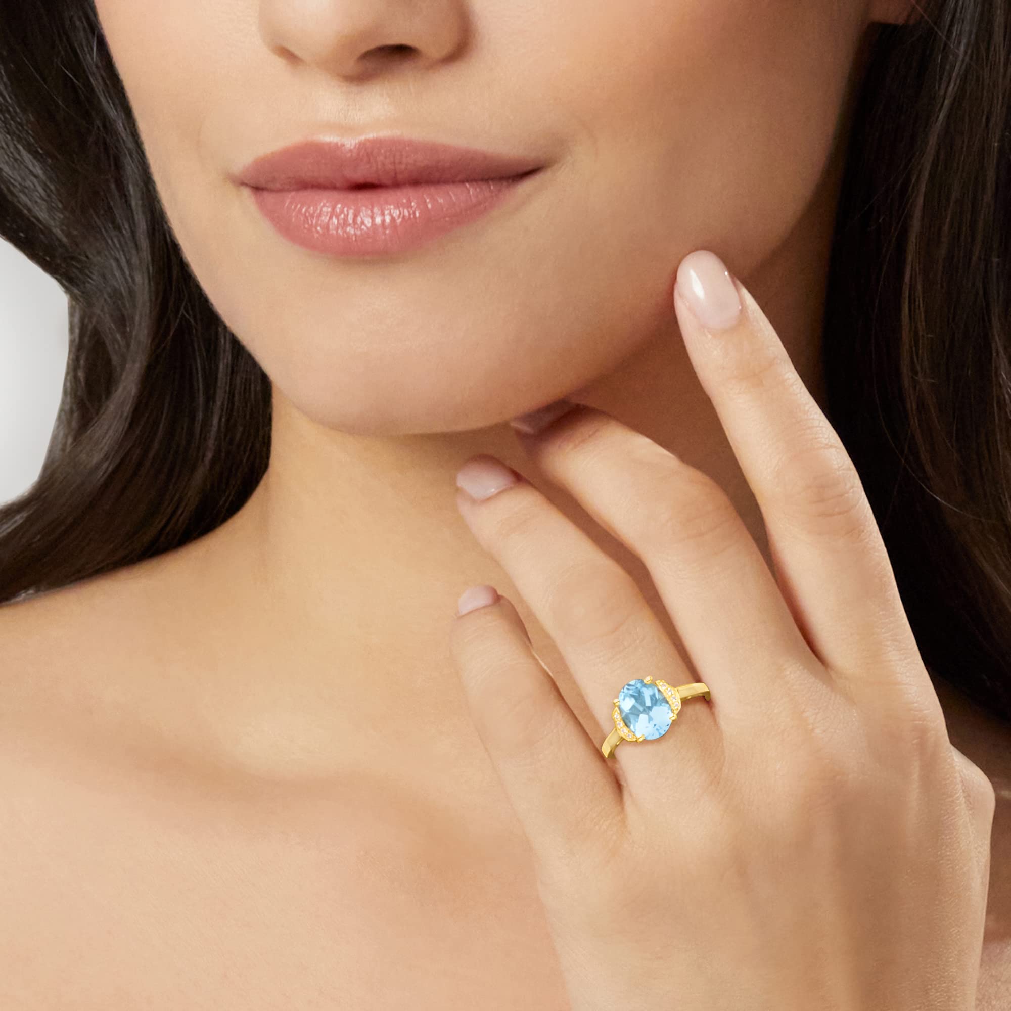 Canaria 2.90 Carat Sky Blue Topaz Ring With White Topaz Accents in 10kt Yellow Gold. Size 7