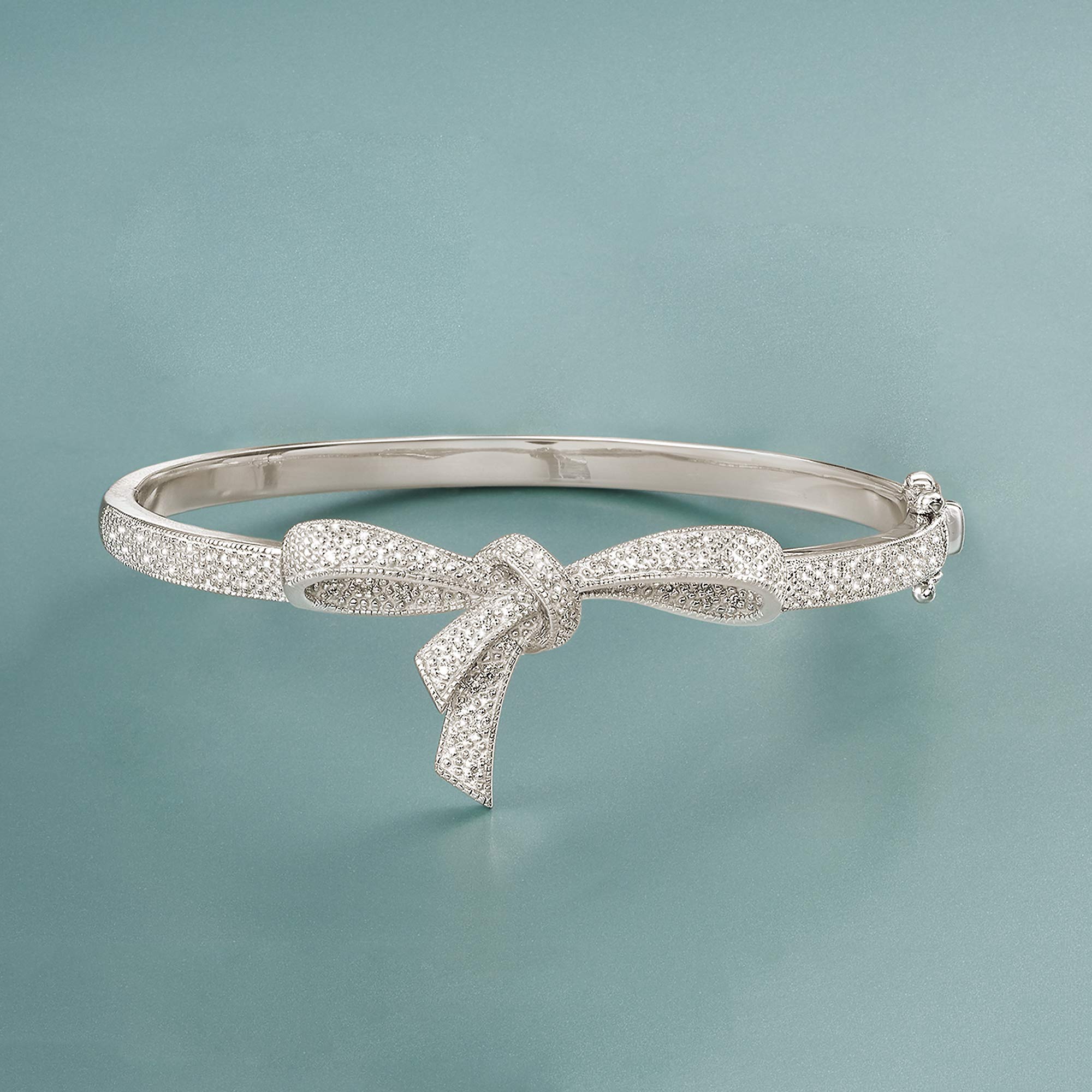 Ross-Simons 0.15 ct. t.w. Diamond Bow Bangle Bracelet in Sterling Silver. 7 inches