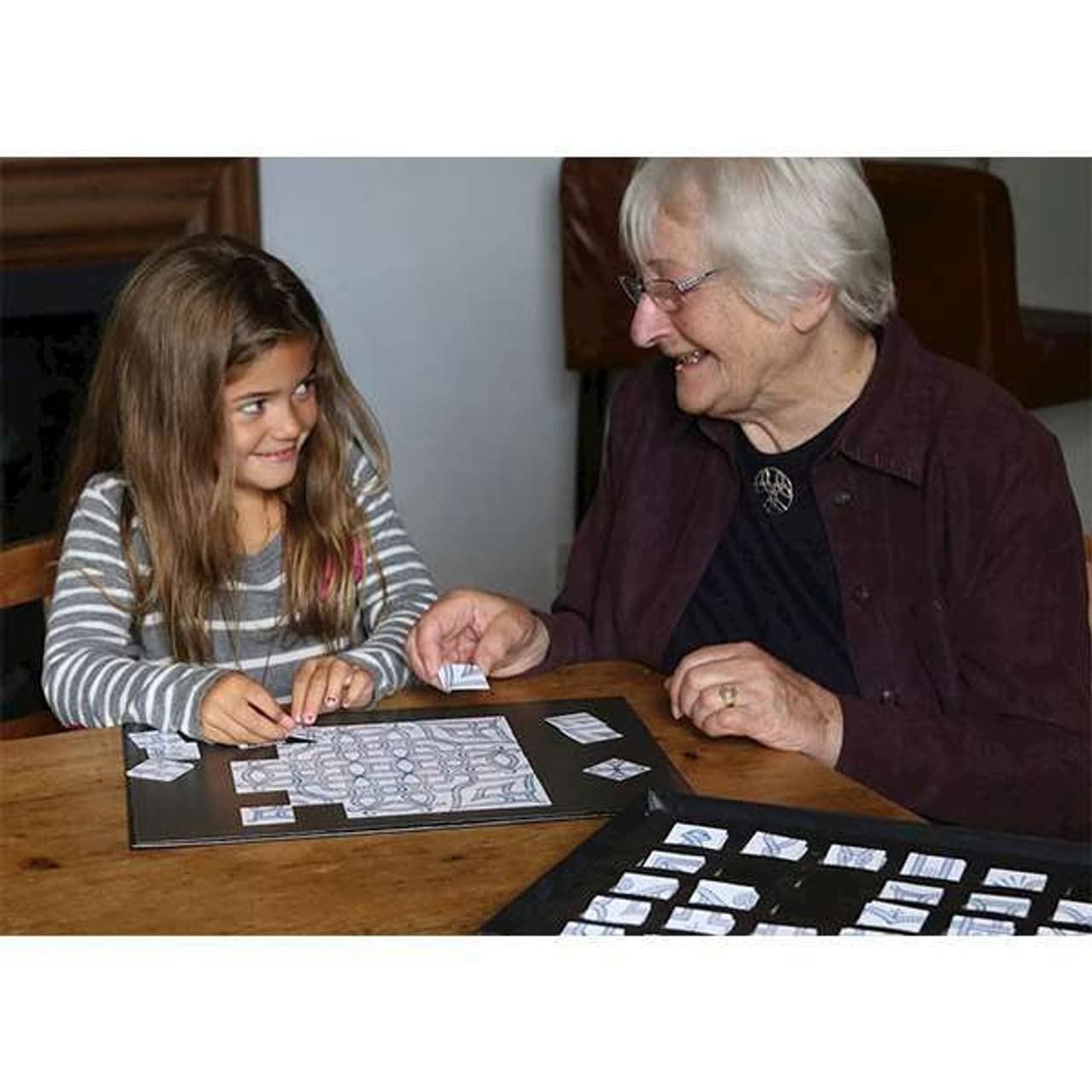 Tillions - Tile Puzzle Game For Kids & Family With Millions Of Possibilities. STEAM Educational Game Promotes Shape Sorting & Symmetry Learning. 144 Magnetic Tiles & Folding Magnetic Board For Ages 6+